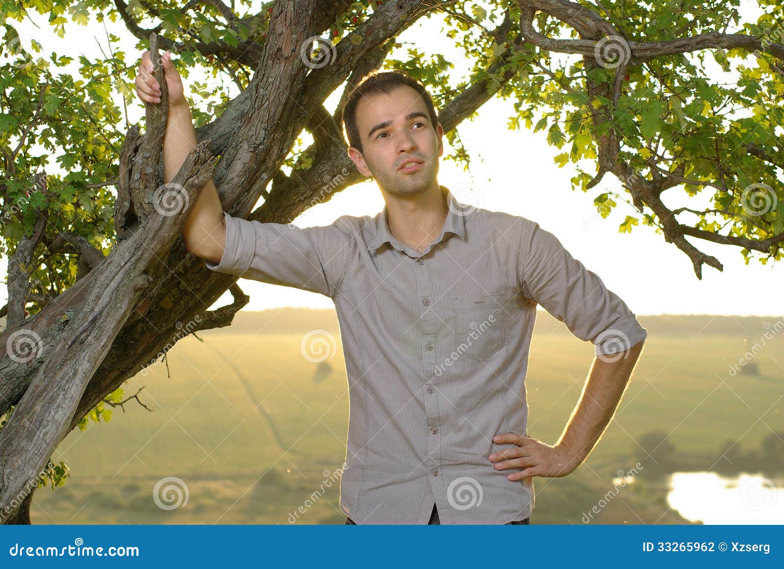 Guy under tree stock photo. Image of hand, beauty, people - 33265962