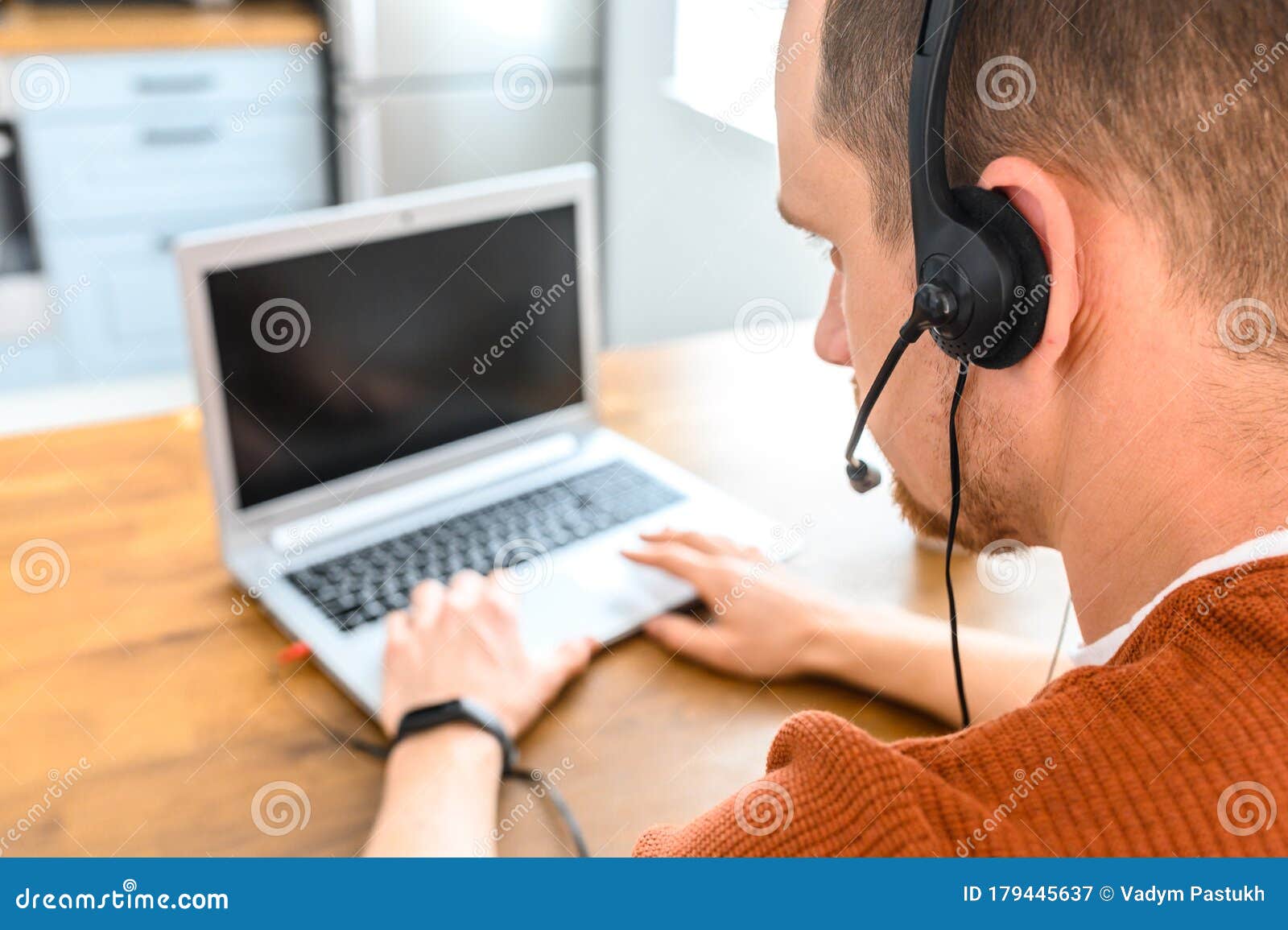 The Guy Uses Hands-free Headsets To Work from Home Stock Image - Image ...