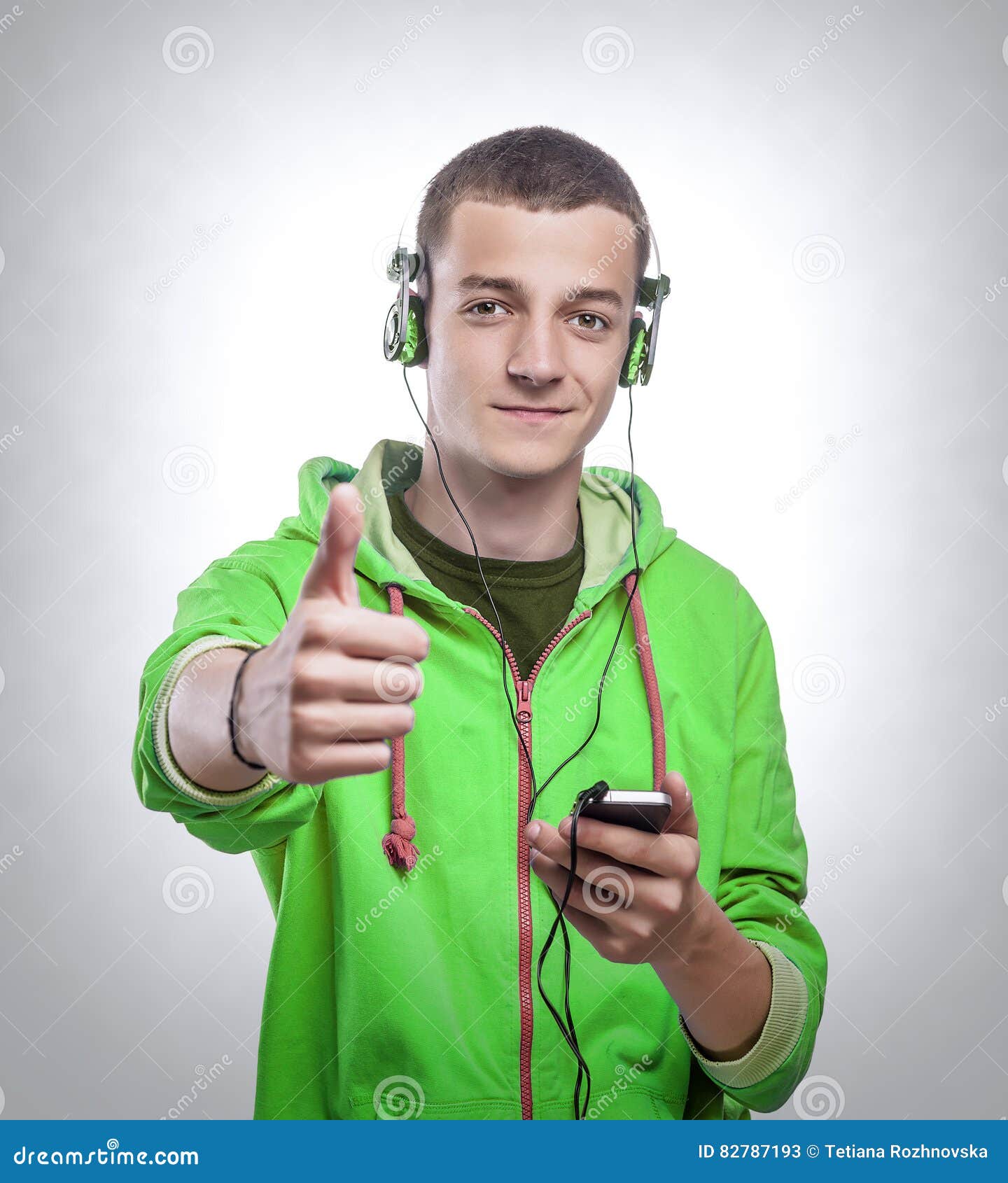 Guy Using Phone with Headphones Stock Image - Image of head, hair: 82787193