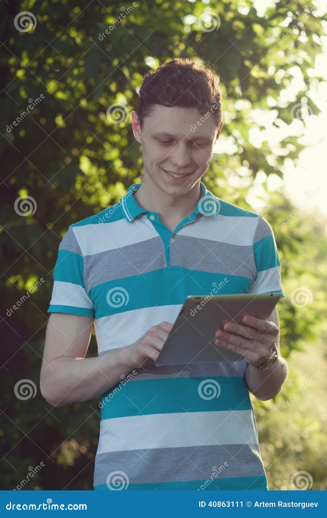Guy using a tablet pc stock image. Image of landscape - 40863111