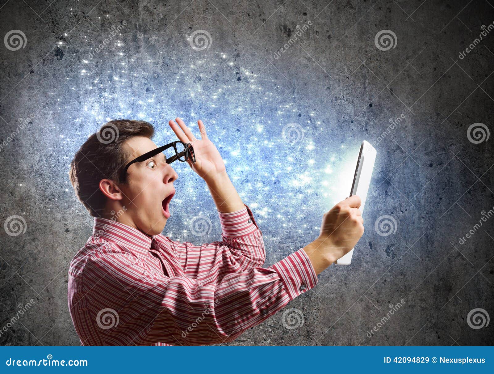 Guy using tablet pc stock image. Image of exaggerated - 42094829