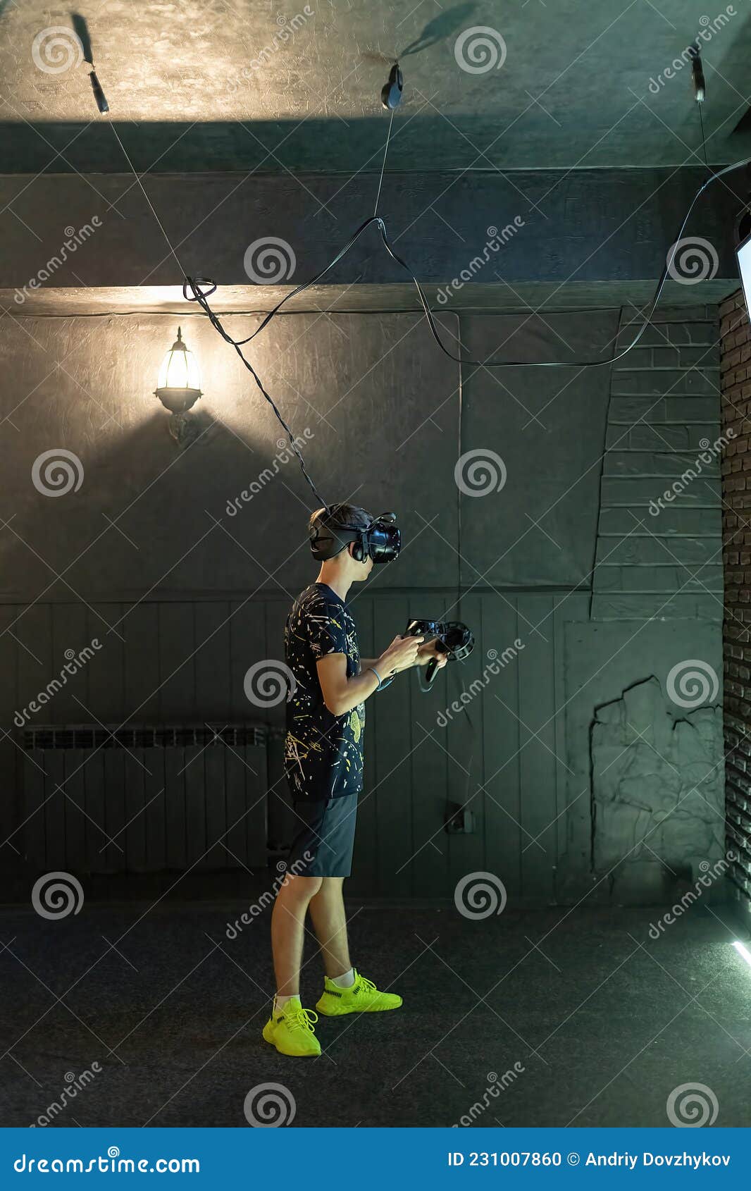 The Guy in the VR Helmet Plays Computer Games Stock Photo - Image of ...