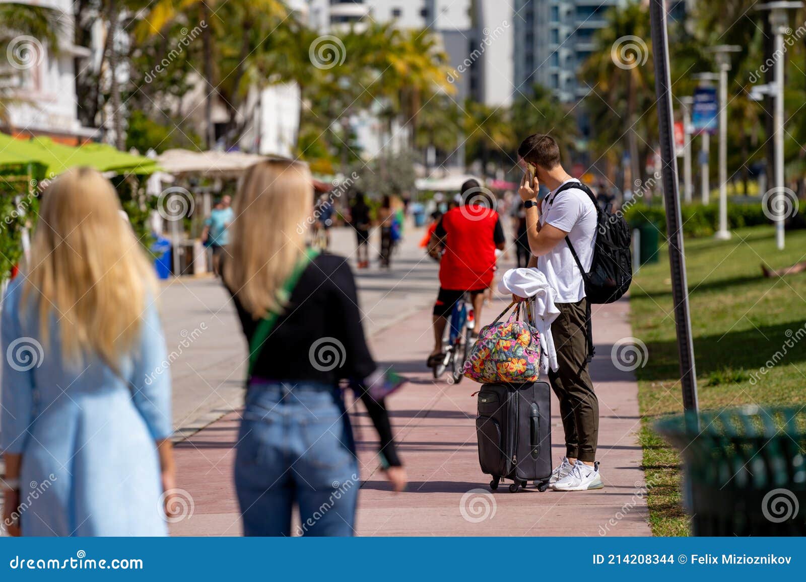 Guy Waiting for an Uber or Lyft Pick Up in Miami Beach Spring Break ...