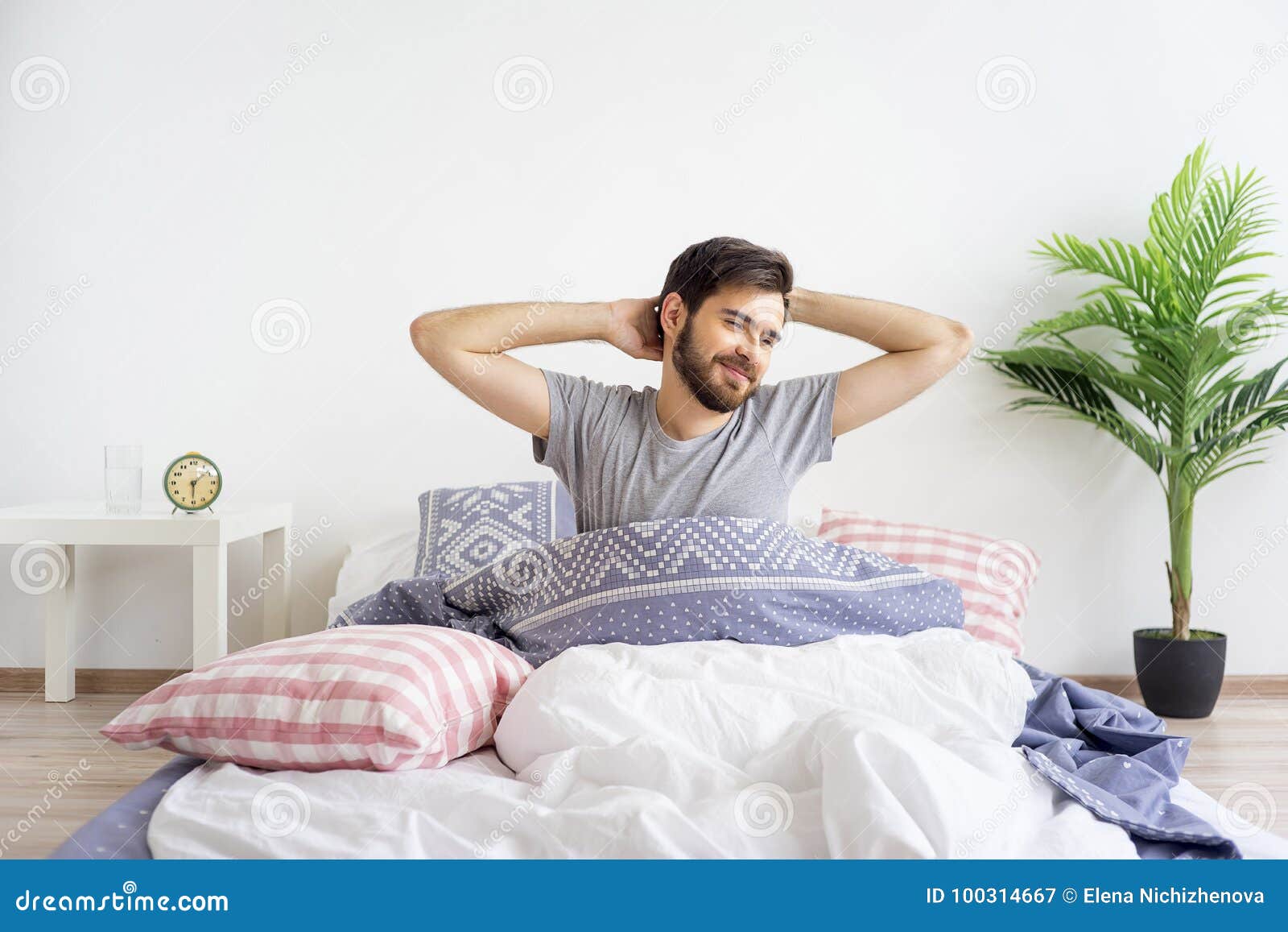 Guy is waking up stock image. Image of happy, stretch - 100314667