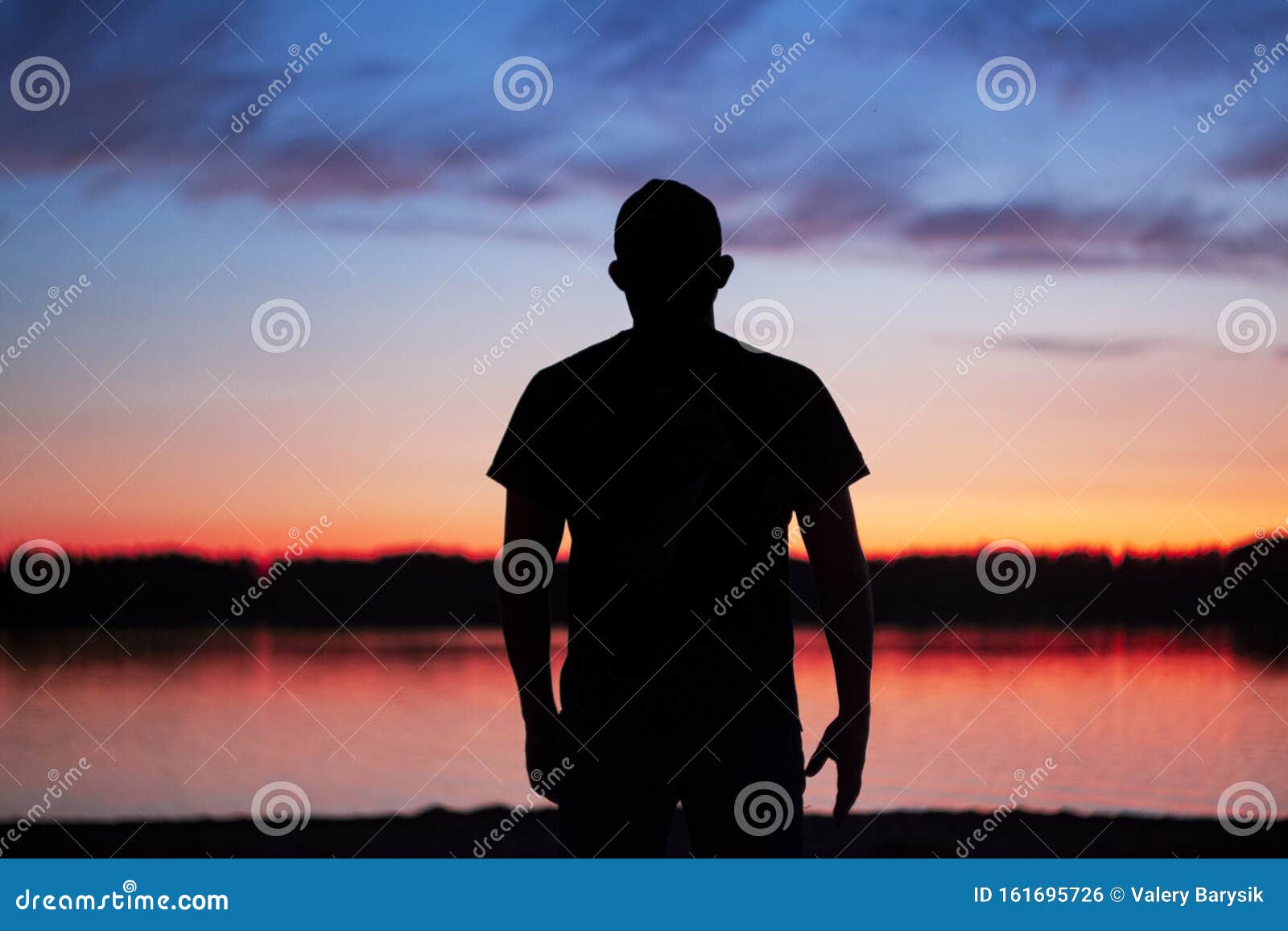 The guy watch the sunset stock photo. Image of beauty - 161695726
