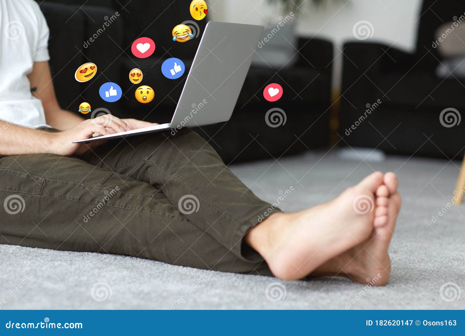 Guy Watching a Social Media Live Stream on a Computer at Home Stock ...