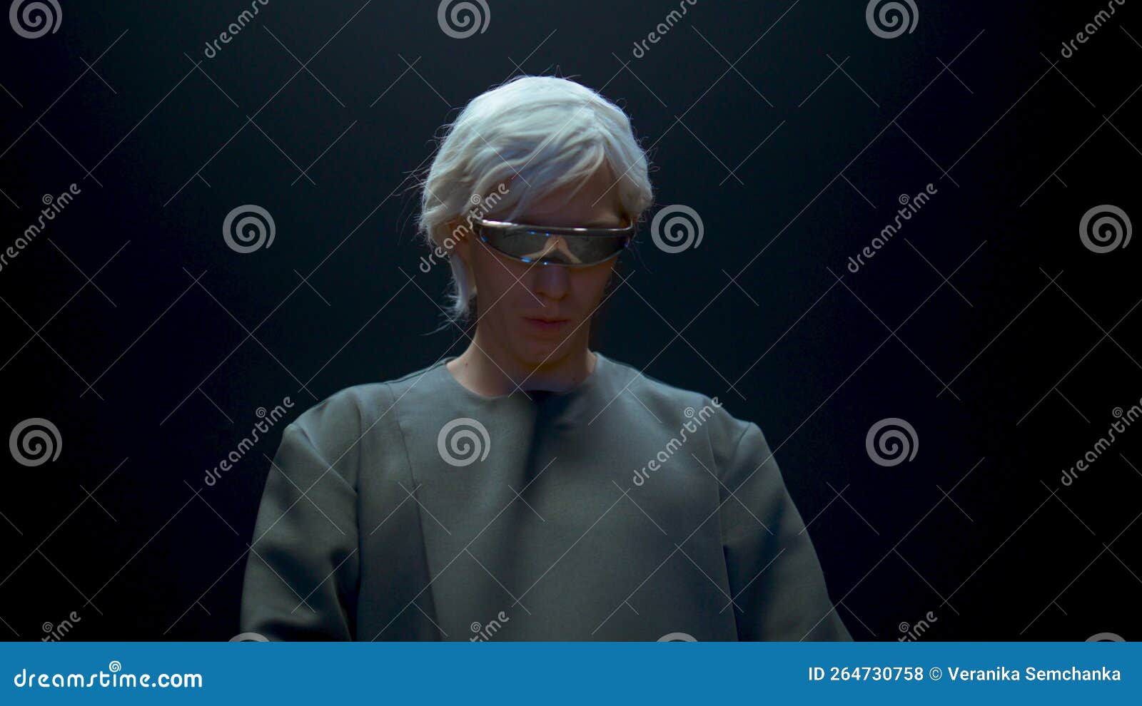 Guy Wearing Futuristic Goggles in Light Closeup. Futuristic Player ...