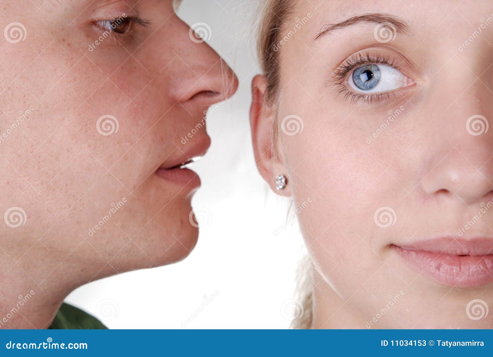 A Guy Whispering Something To a Girl Stock Image - Image of smile ...