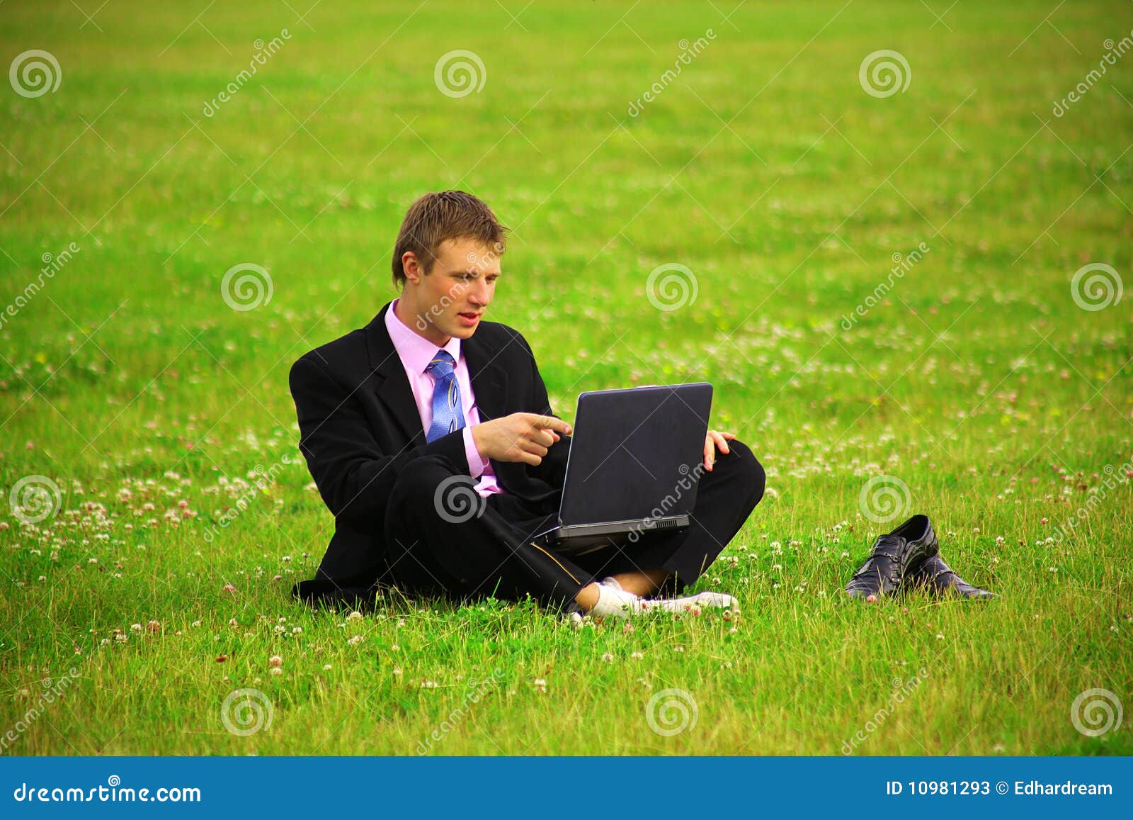 Guy is working outdoors stock image. Image of computer - 10981293