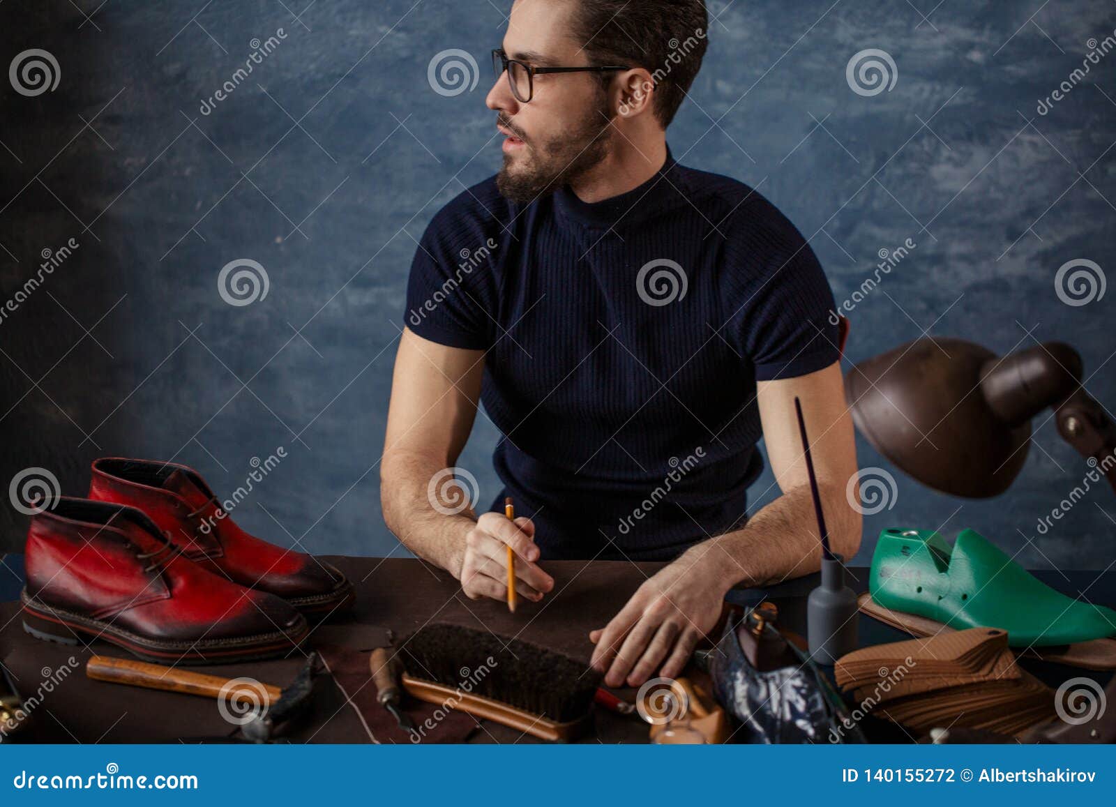 Guy Working in a Shoe Trade Stock Photo - Image of professional, hand ...
