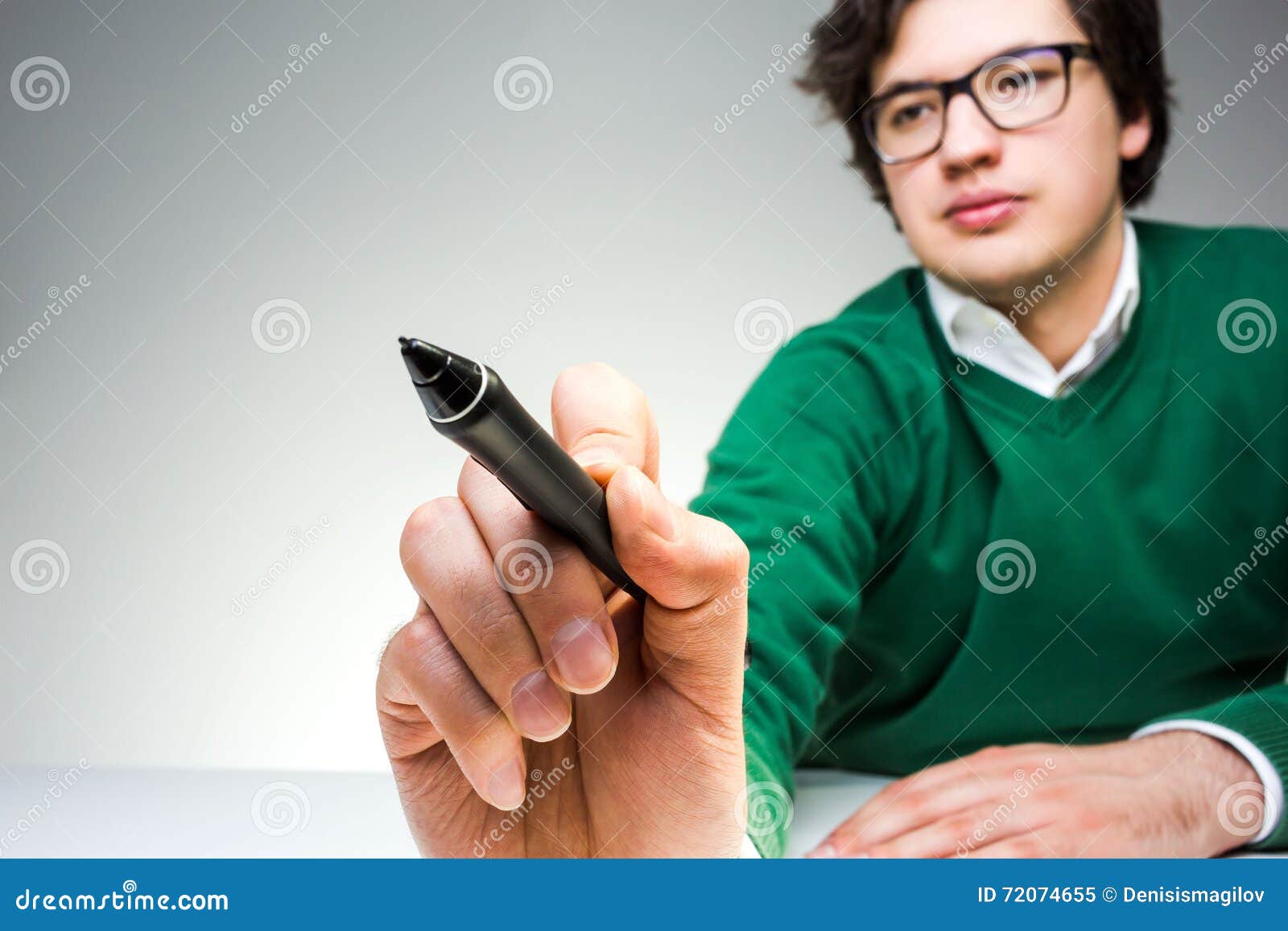 Guy writing with marker stock image. Image of looking - 72074655