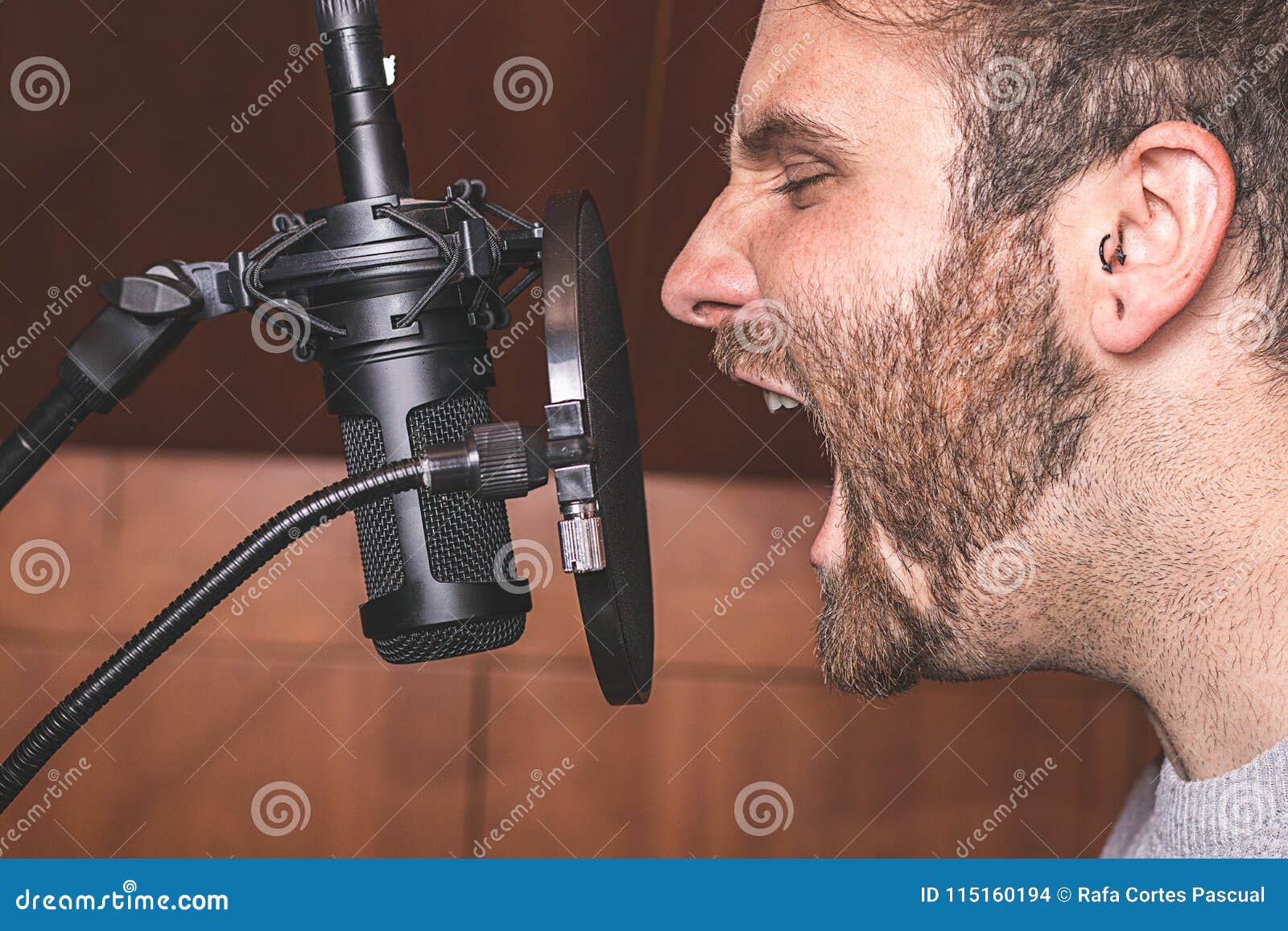 Guy Yelling at a Microphone Stock Photo - Image of star, karaoke: 115160194