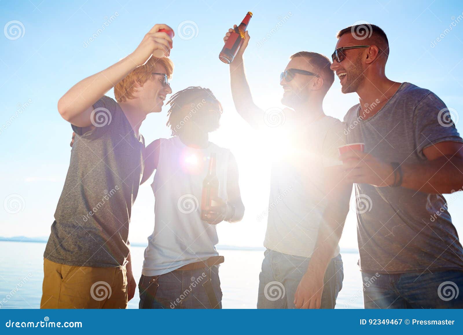 Guys cheering stock image. Image of intercultural, hangout - 92349467