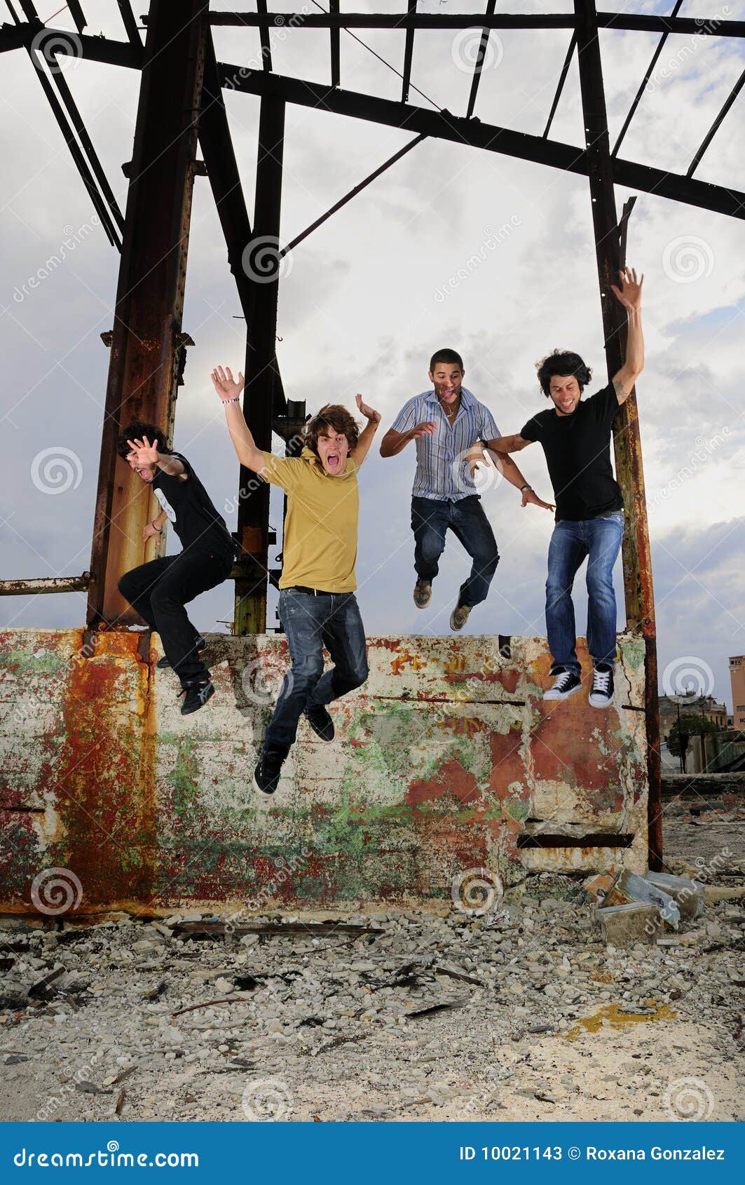 Guys jumping stock image. Image of casual, jumping, group - 10021143