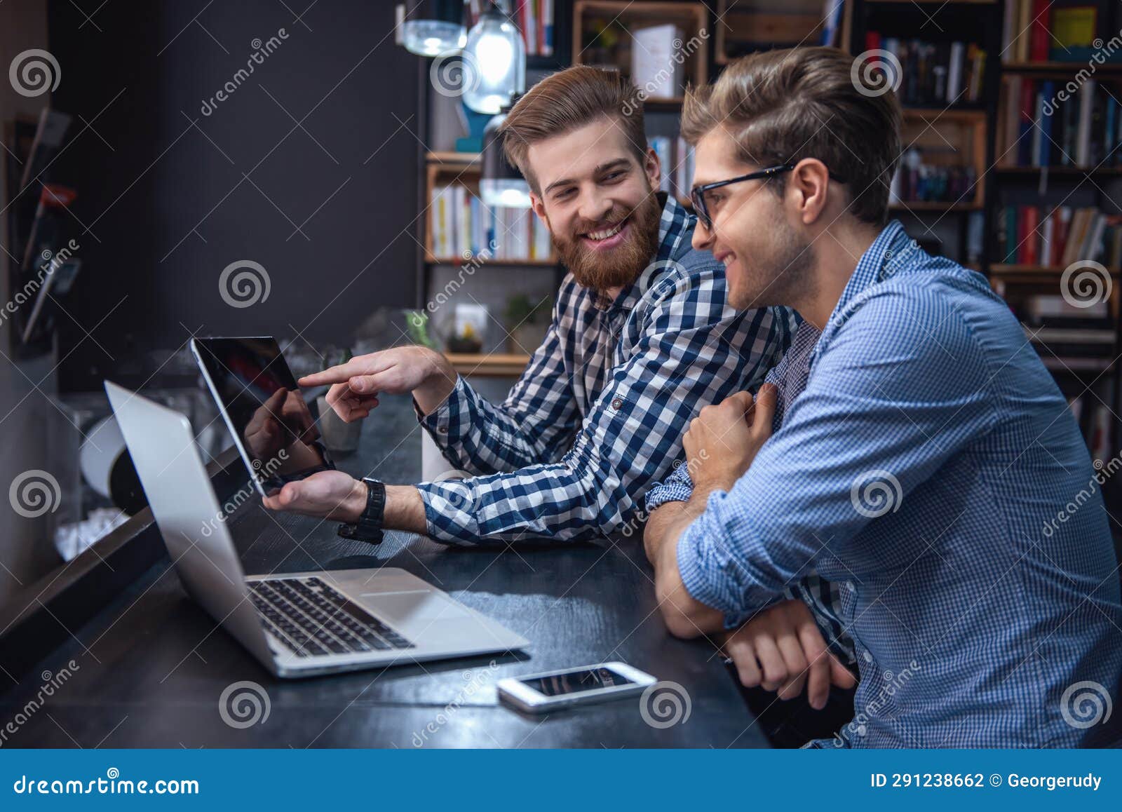 Guys in the library stock photo. Image of bookshelf - 291238662