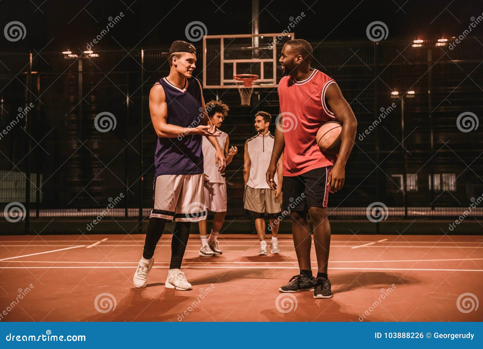 Guys playing basketball stock photo. Image of court - 103888226