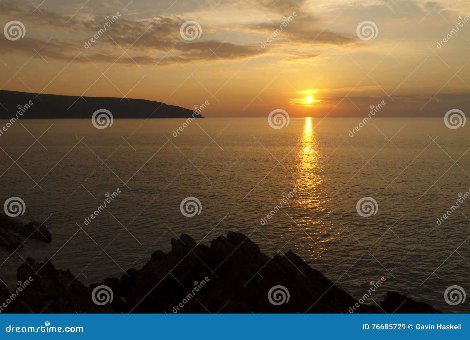 Gwbert sunset stock image. Image of west, cymru, seaside - 76685729