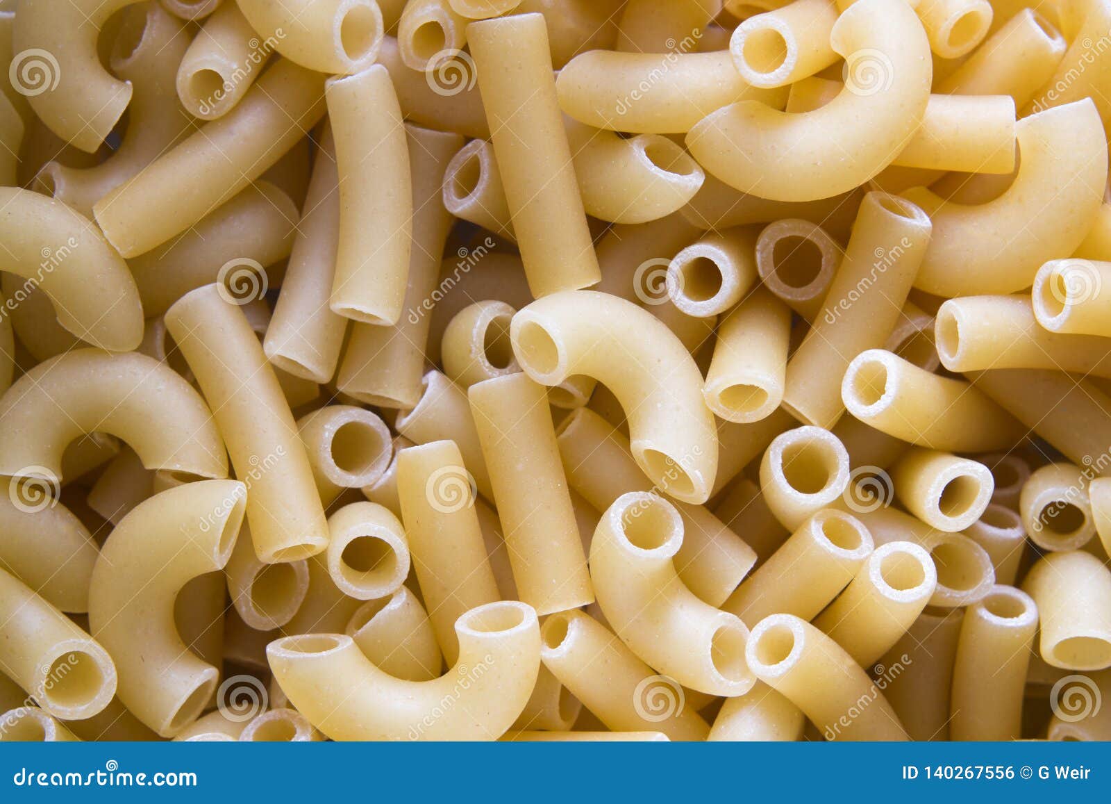 A Close Up of Dry Uncooked Macaroni Pasta Stock Photo - Image of ...