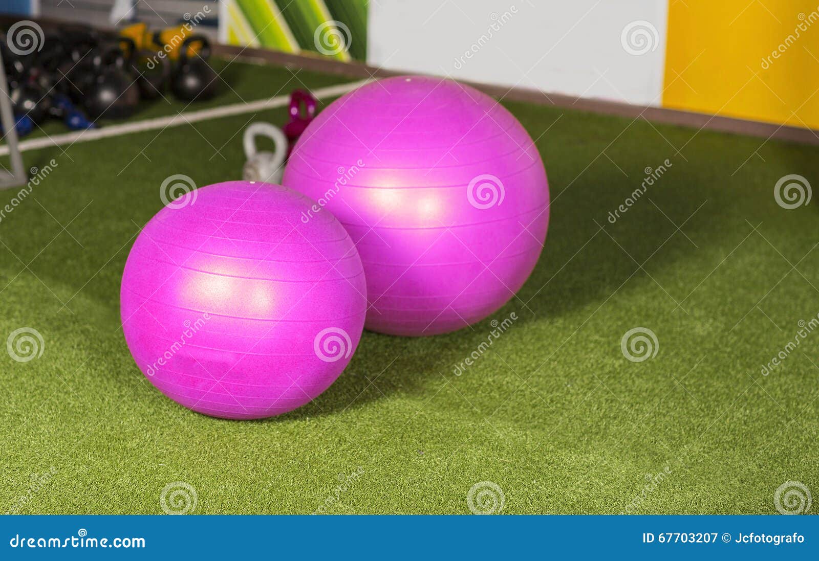 Gym balls stock image. Image of sporting, balls, weights - 67703207