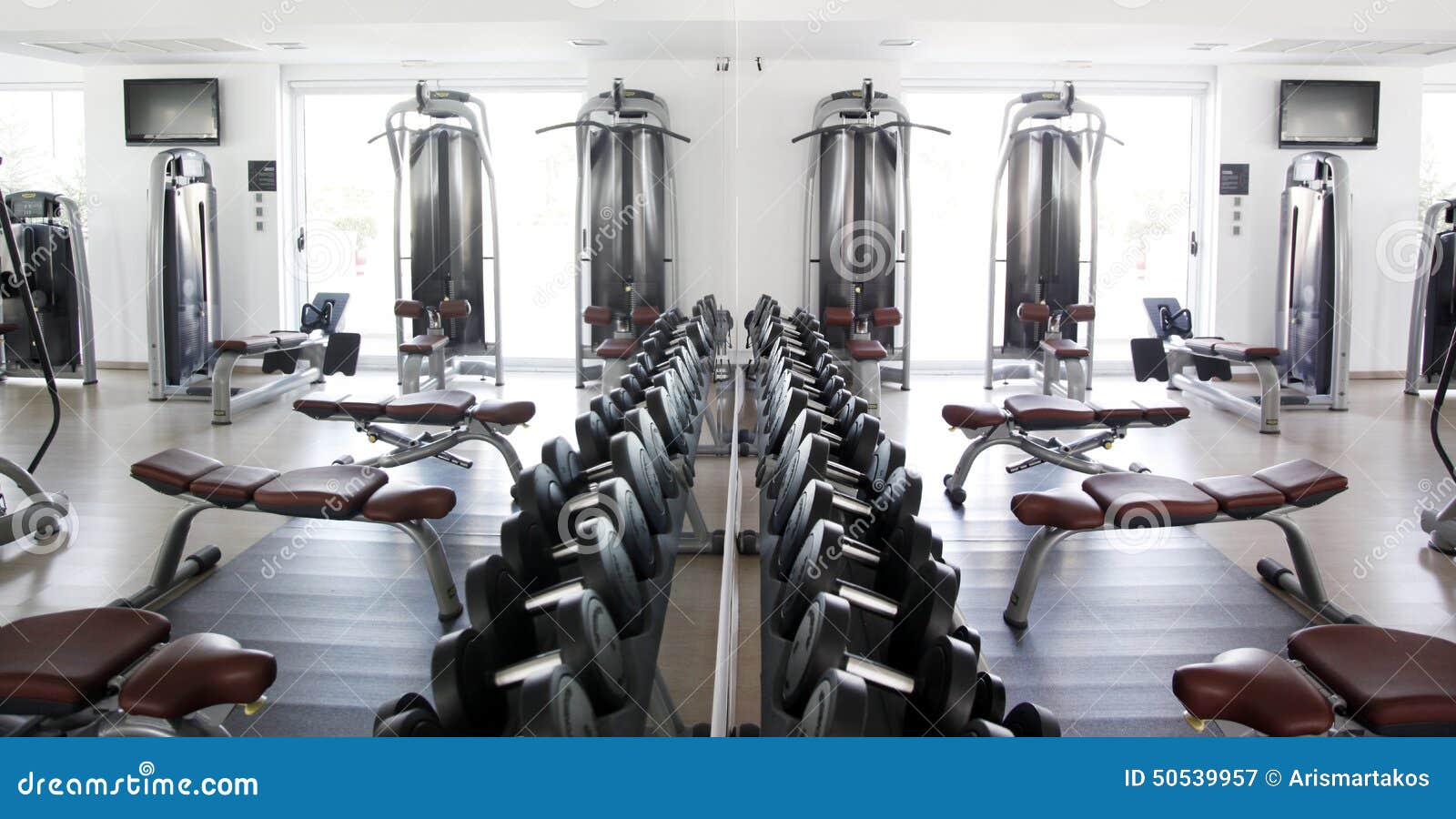 Gym Equipment in Mirror Reflection Stock Image - Image of gymnasium ...
