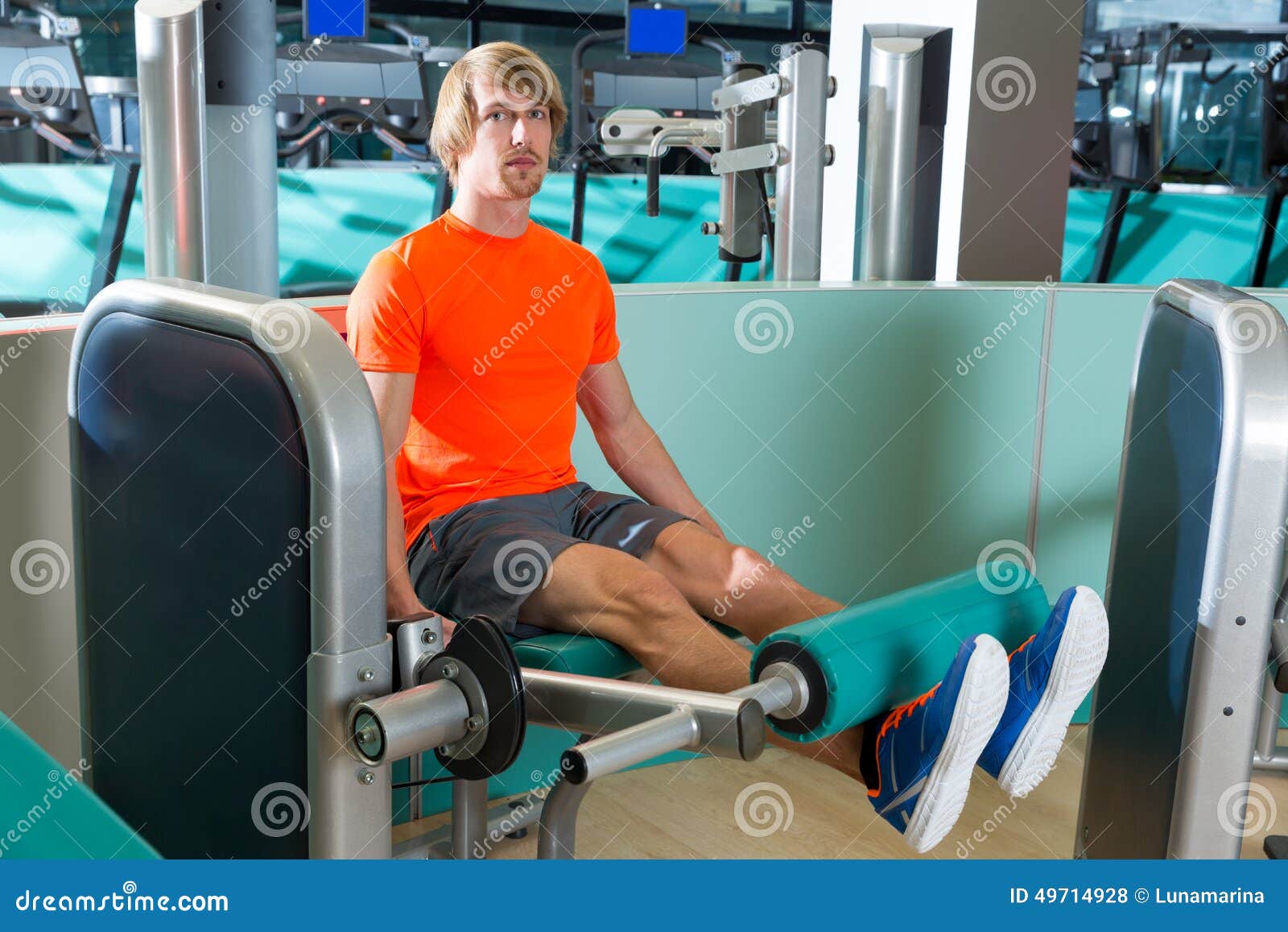 Gym Leg Extension Exercise Workout Man Stock Photo - Image of ...
