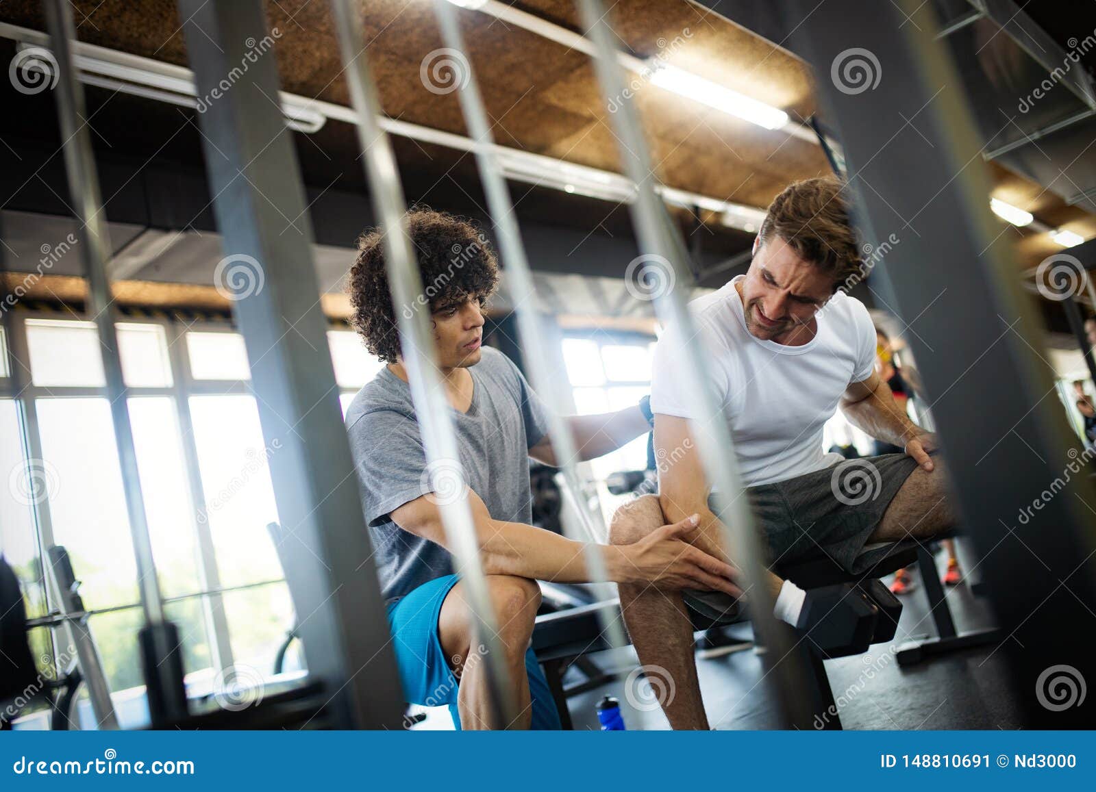 Gym Personal Trainer Man with Weight Training Equipment Stock Image ...