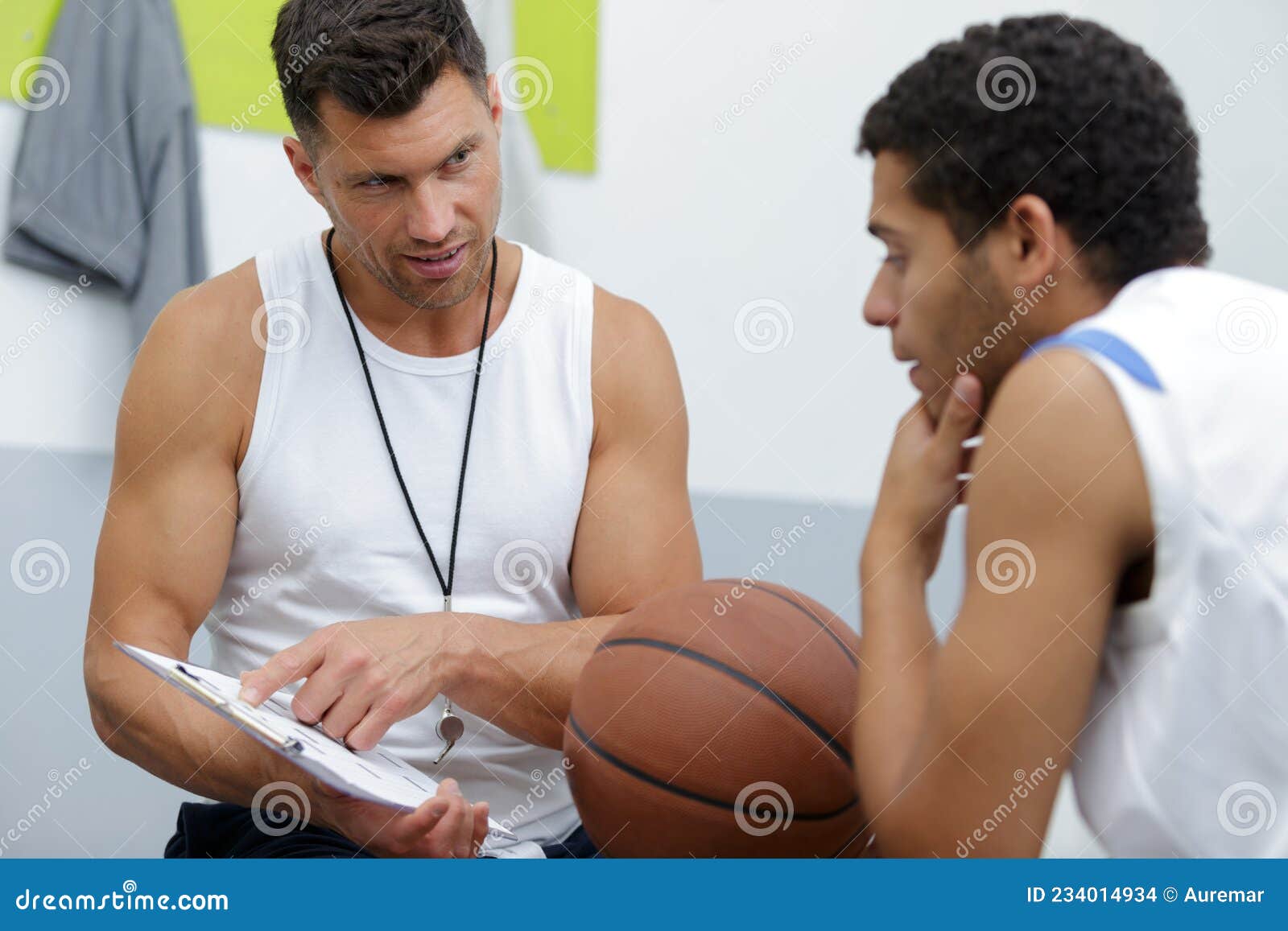 Gym Teacher with Basketball Player Stock Photo - Image of teaching ...