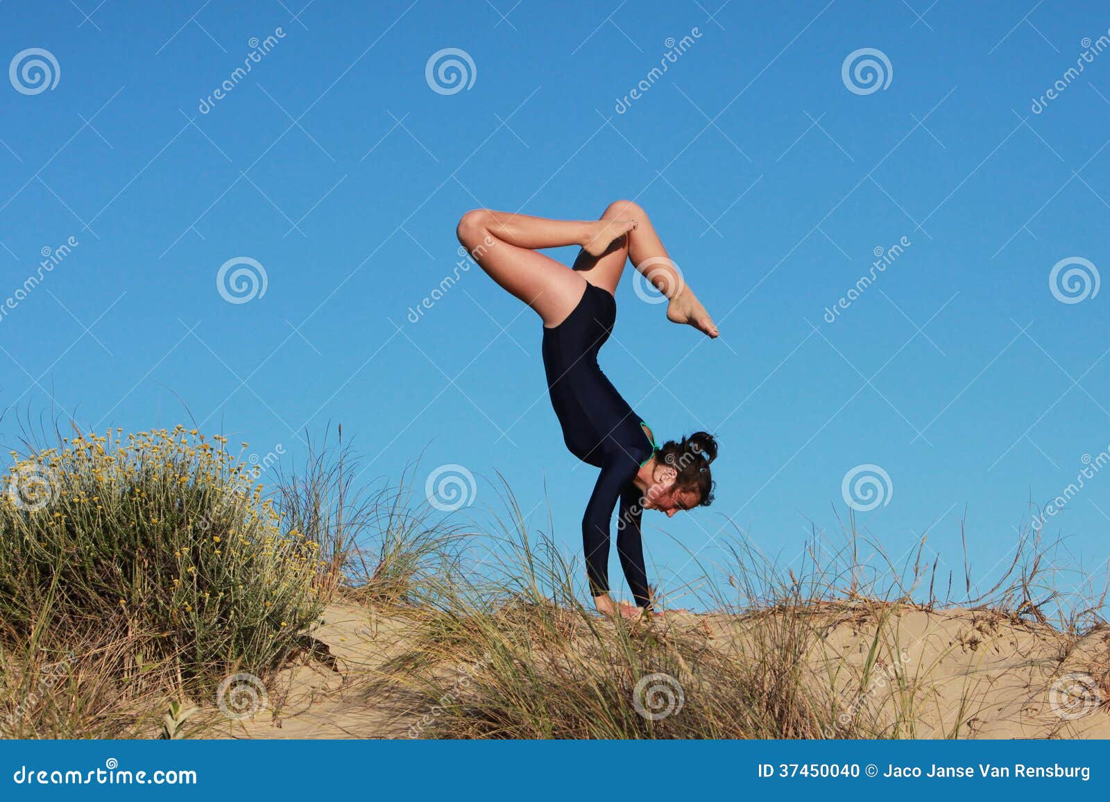 Gymnast Doing Acrobatic Handstand on the Beach Stock Photo - Image of ...