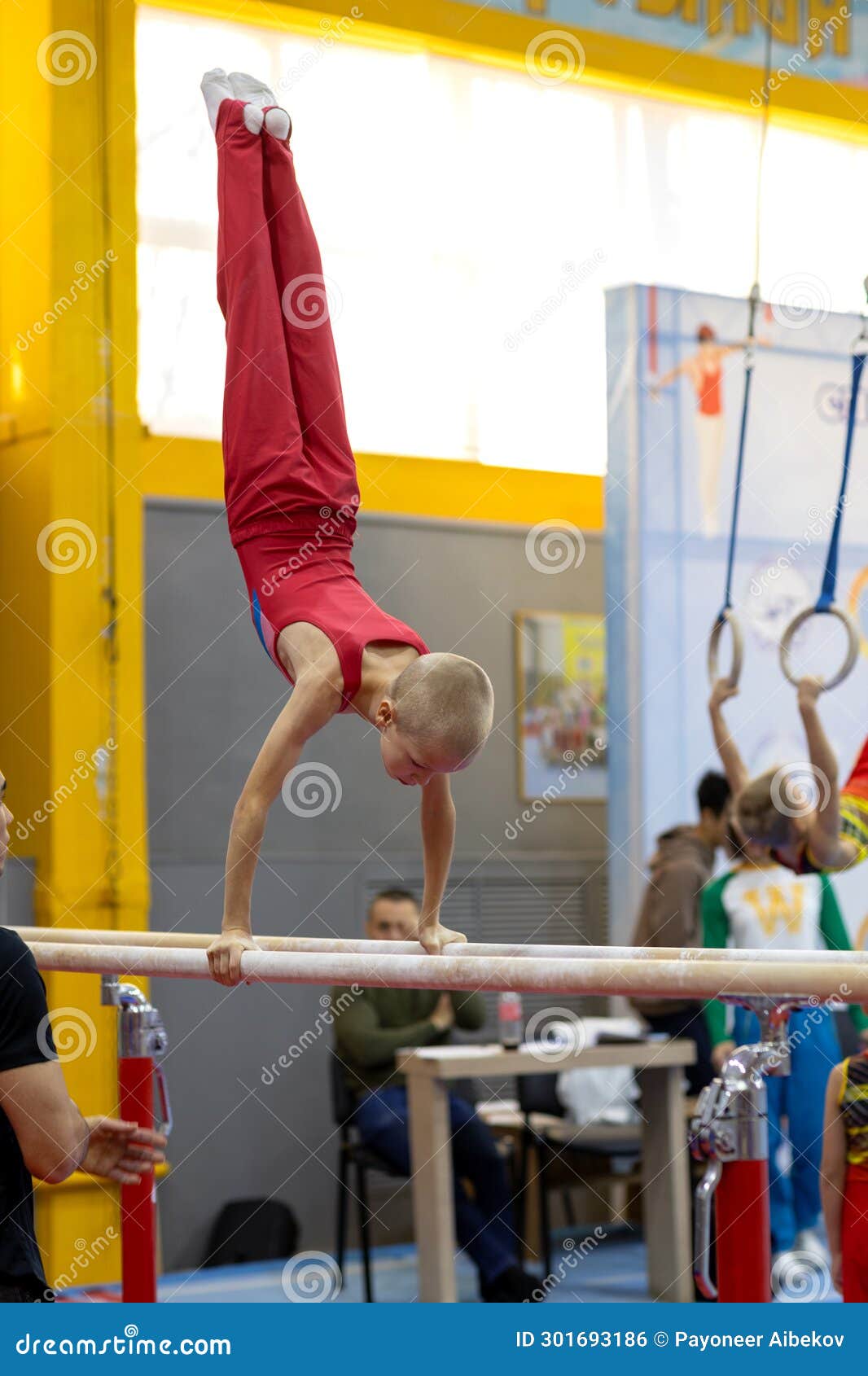 Gymnast Exercise Parallel Bars in Championship Gymnastics, Element ...
