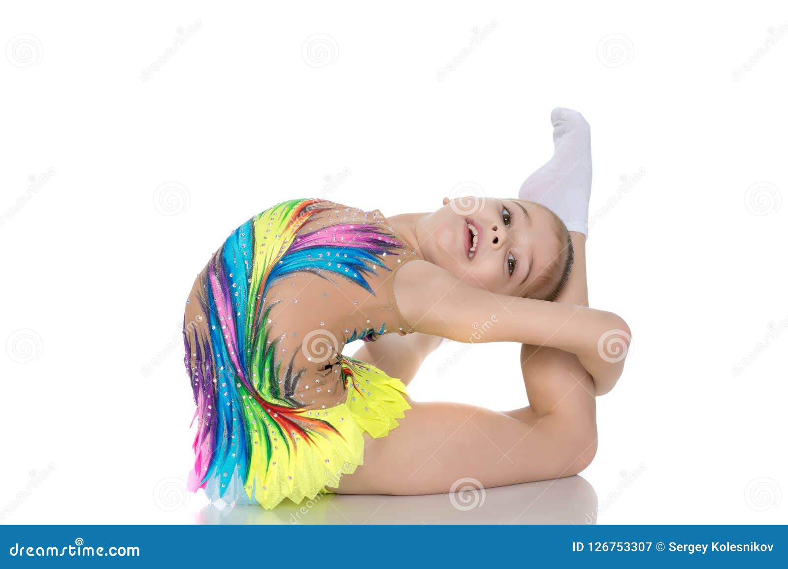 The Gymnast Perform An Acrobatic Element On The Floor Stock Image