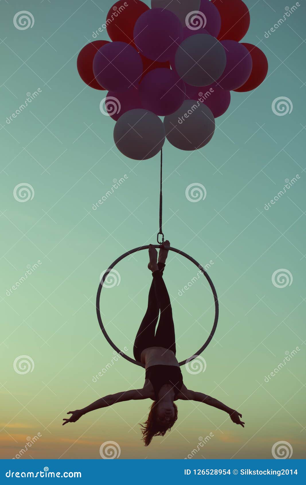 Gymnast Performs Acrobatic Stunts on the Ring. Stock Photo - Image of ...