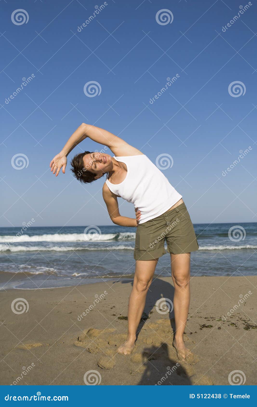 Gymnastics on the beach stock photo. Image of healthy - 5122438
