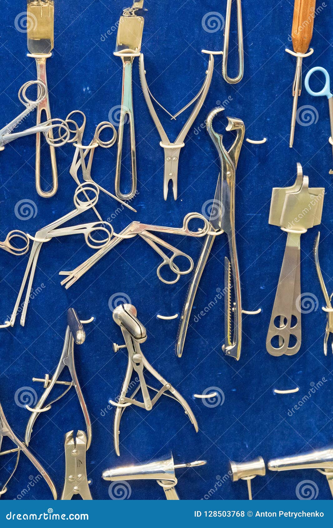 Gynecological Instruments on Blue Background. Vertical Photo. Stock ...