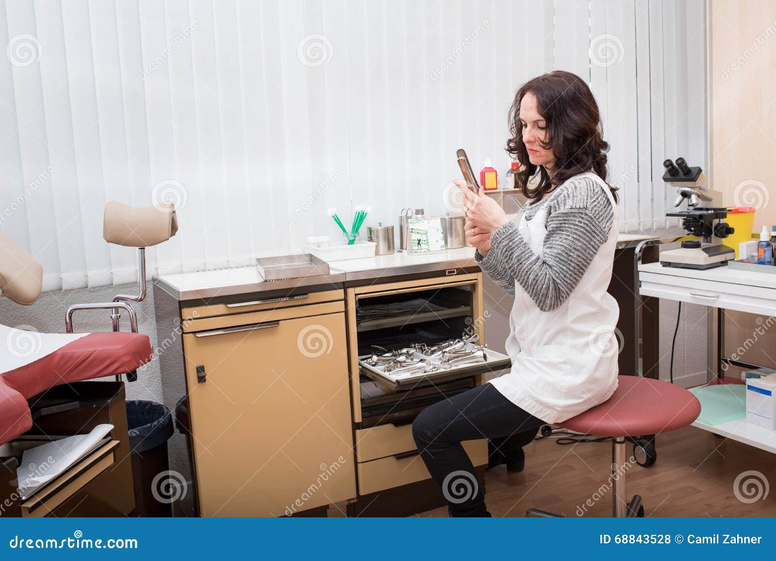 Gynecologist working stock photo. Image of brunette, gynecology - 68843528