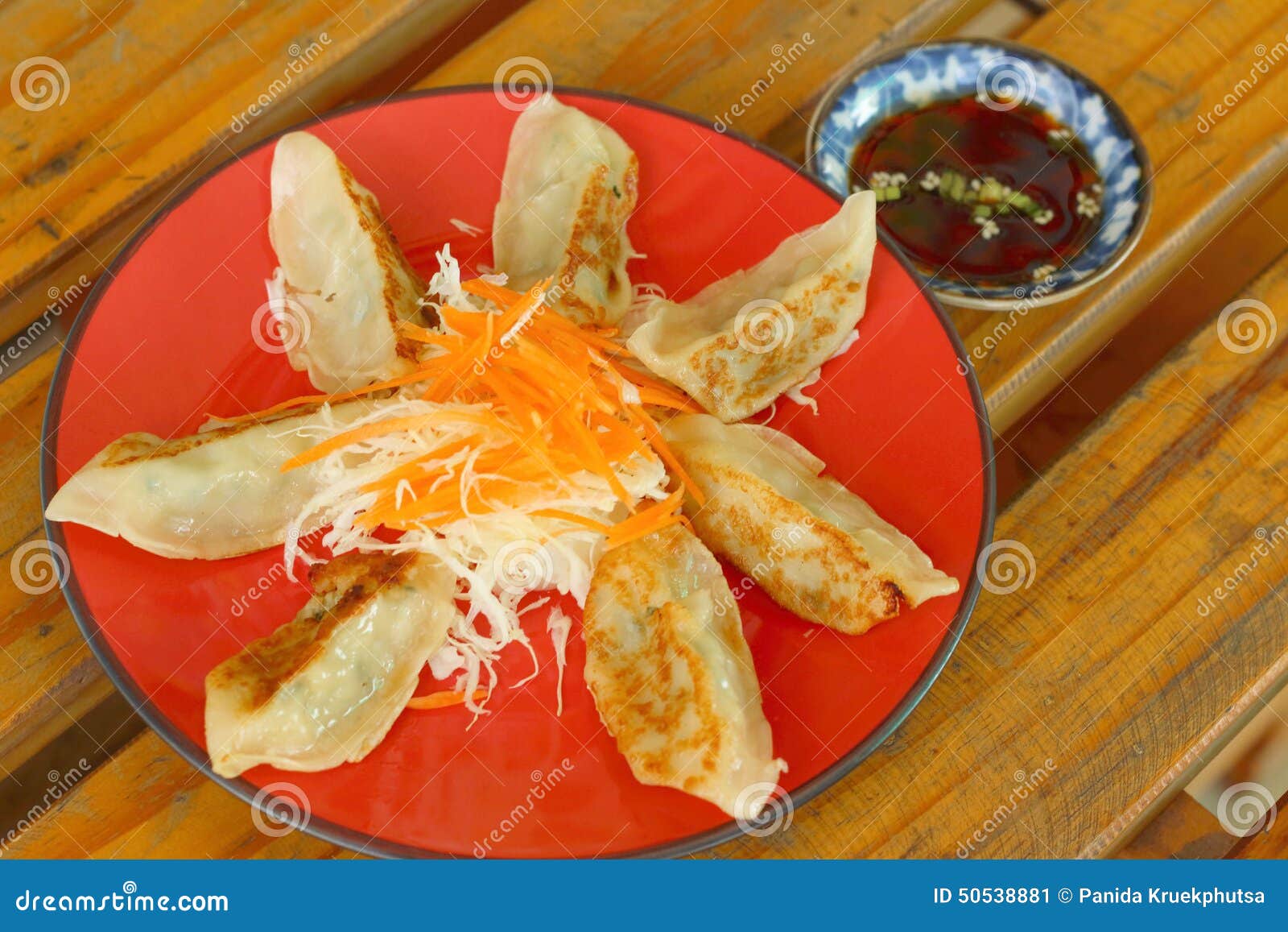 Gyoza in a Red Plate on a Table Stock Image - Image of japan, dish ...