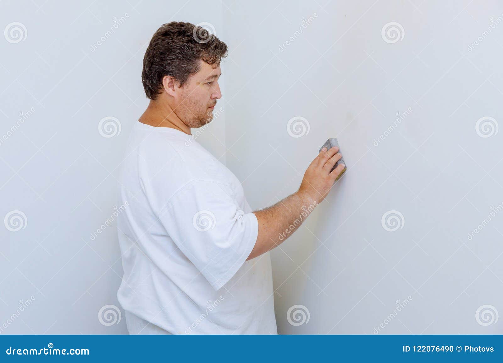 Gypsum Panel In The Form Of On The Wall. Master Plasterer Smooths The ...