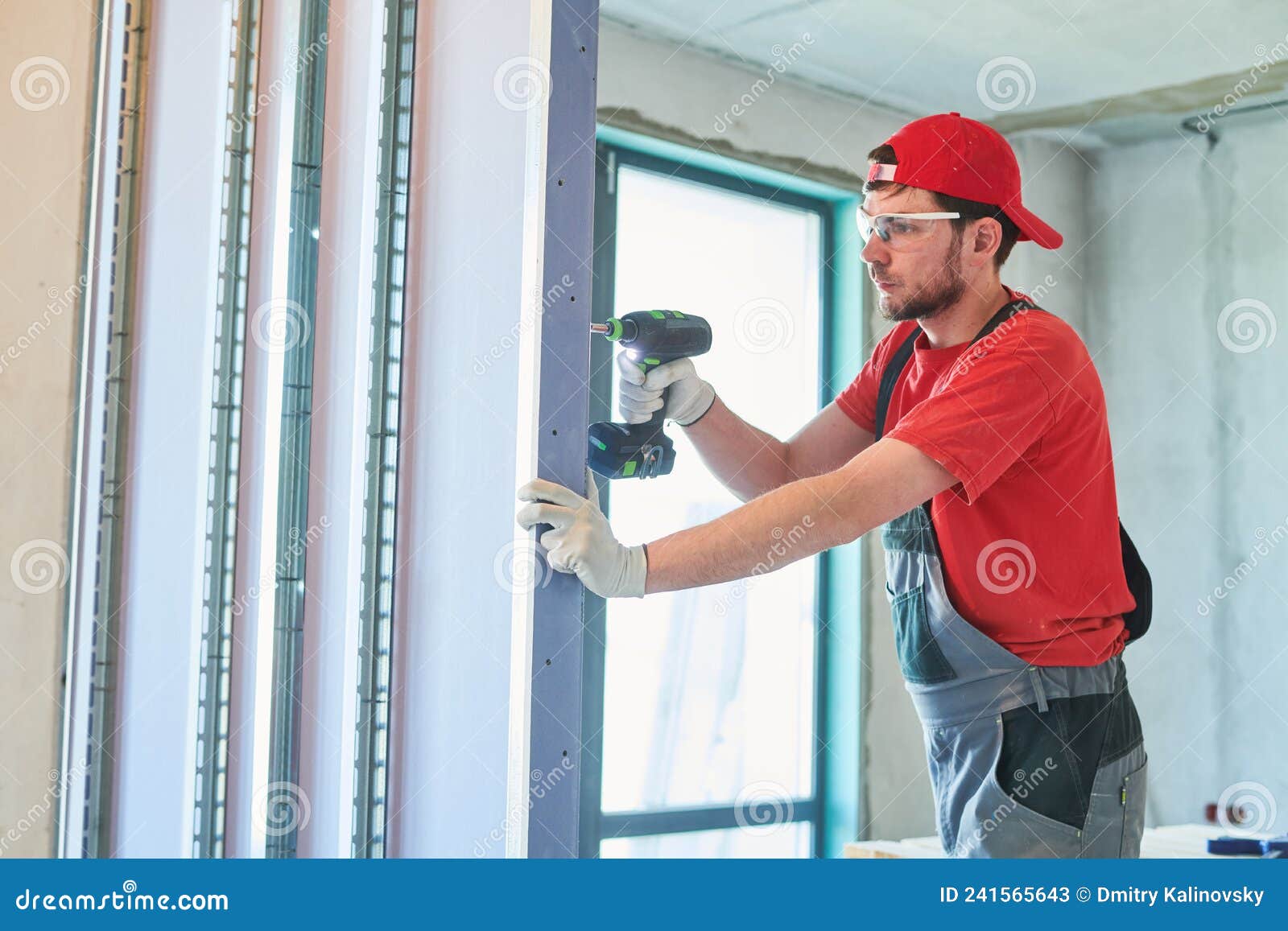 Gypsum Plasterboard Work. Drywall Construction at Home. Contractor ...