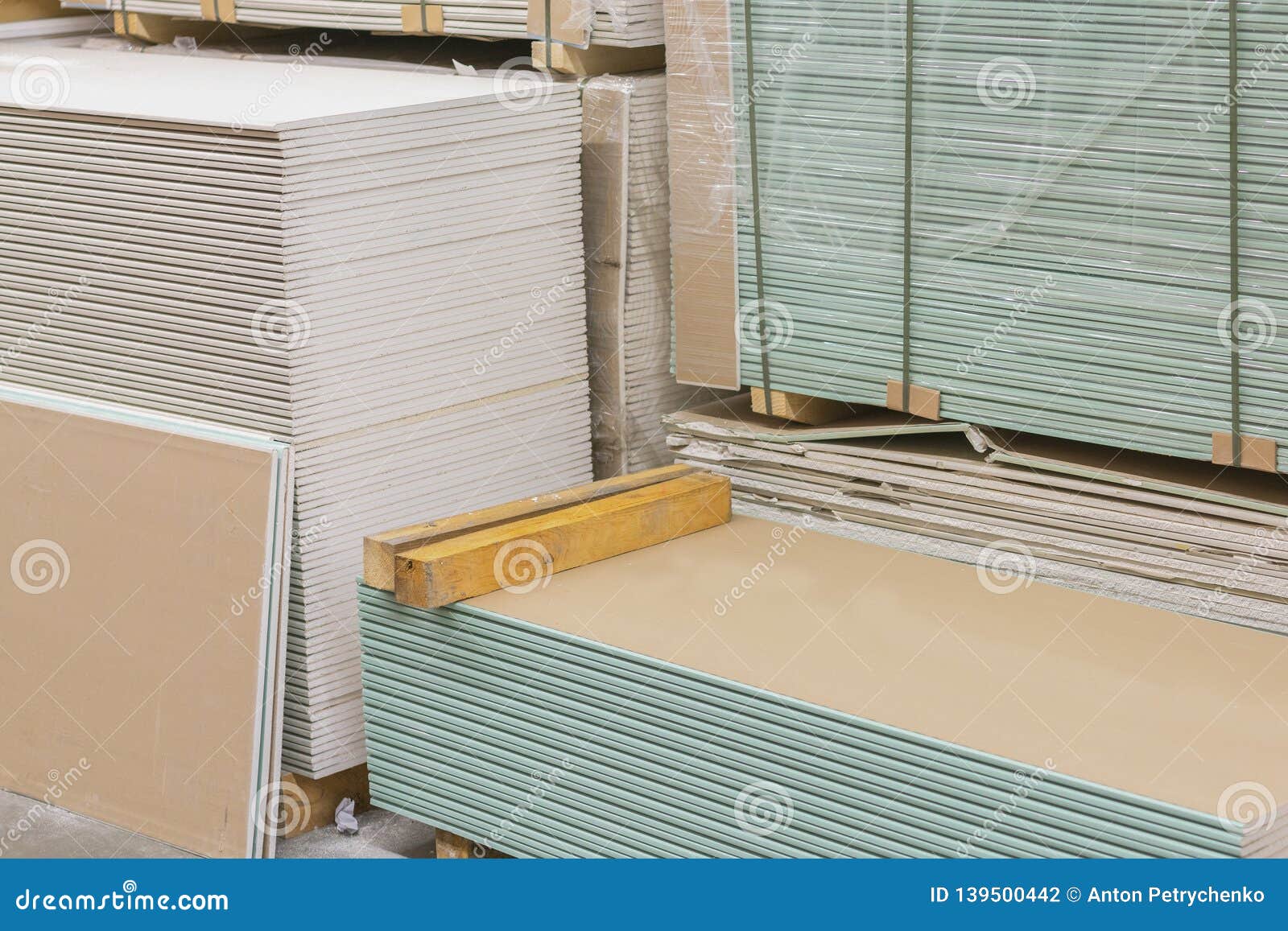 Gypsum Plasterboard in the Pack. the Stack of Gypsum Board Preparing ...
