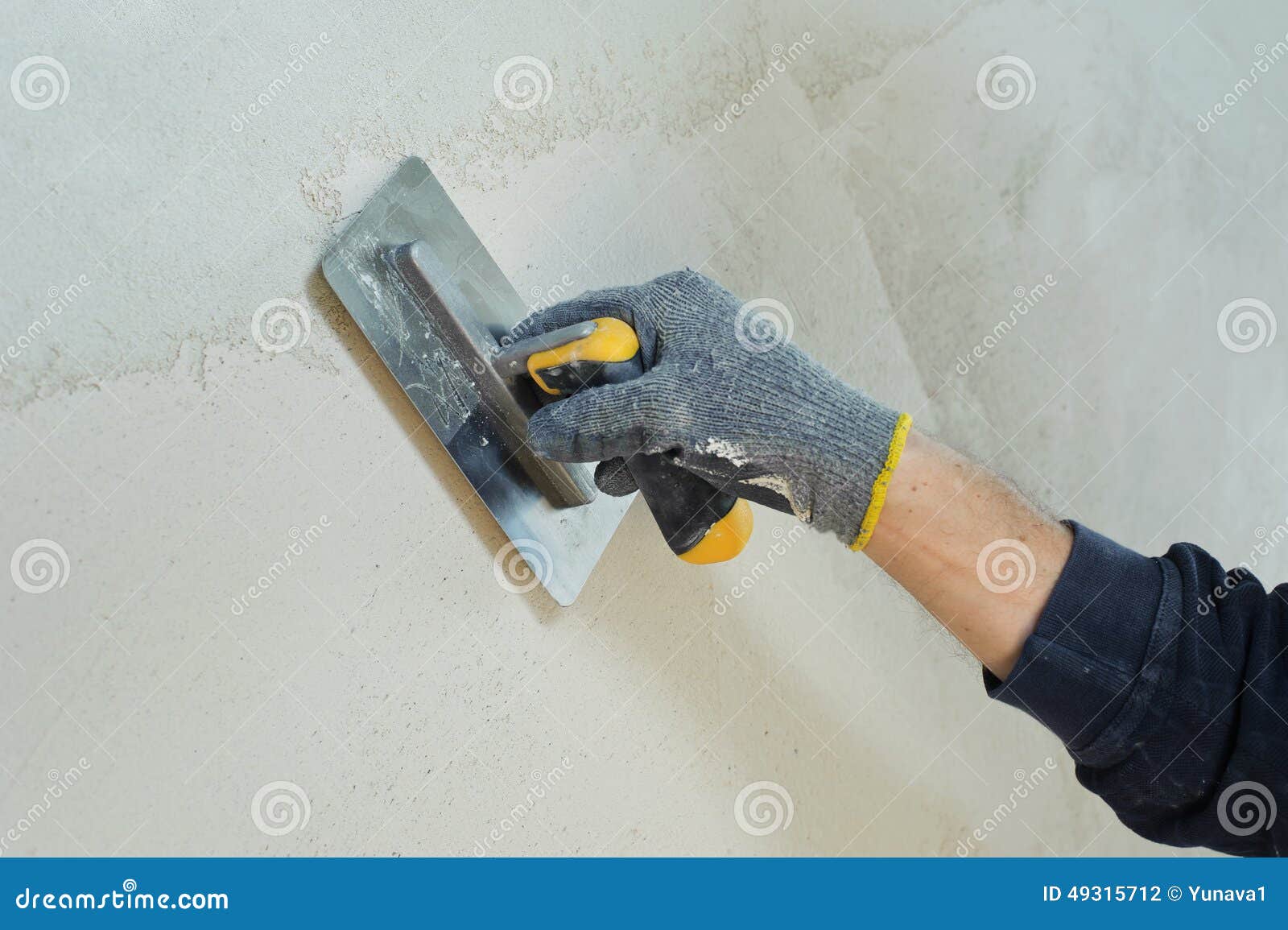Gypsum puttying manually. stock photo. Image of skill - 49315712
