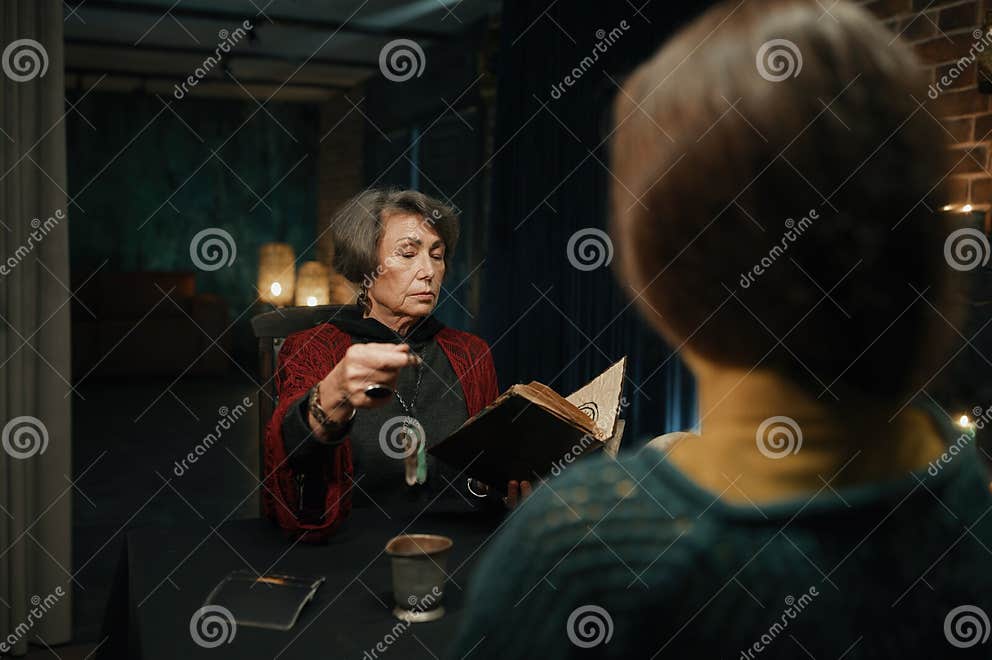 Gypsy Reading Spell for Client Using Witchcraft Book and Magic Pendulum ...