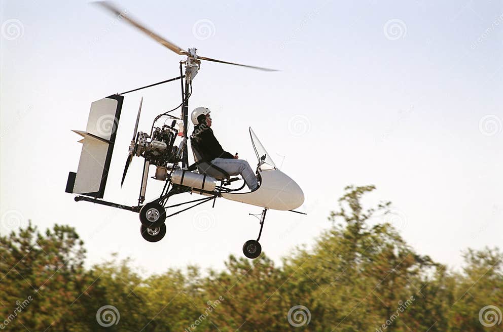 Gyrocopter in flight stock photo. Image of pilot, helicopter - 1392060