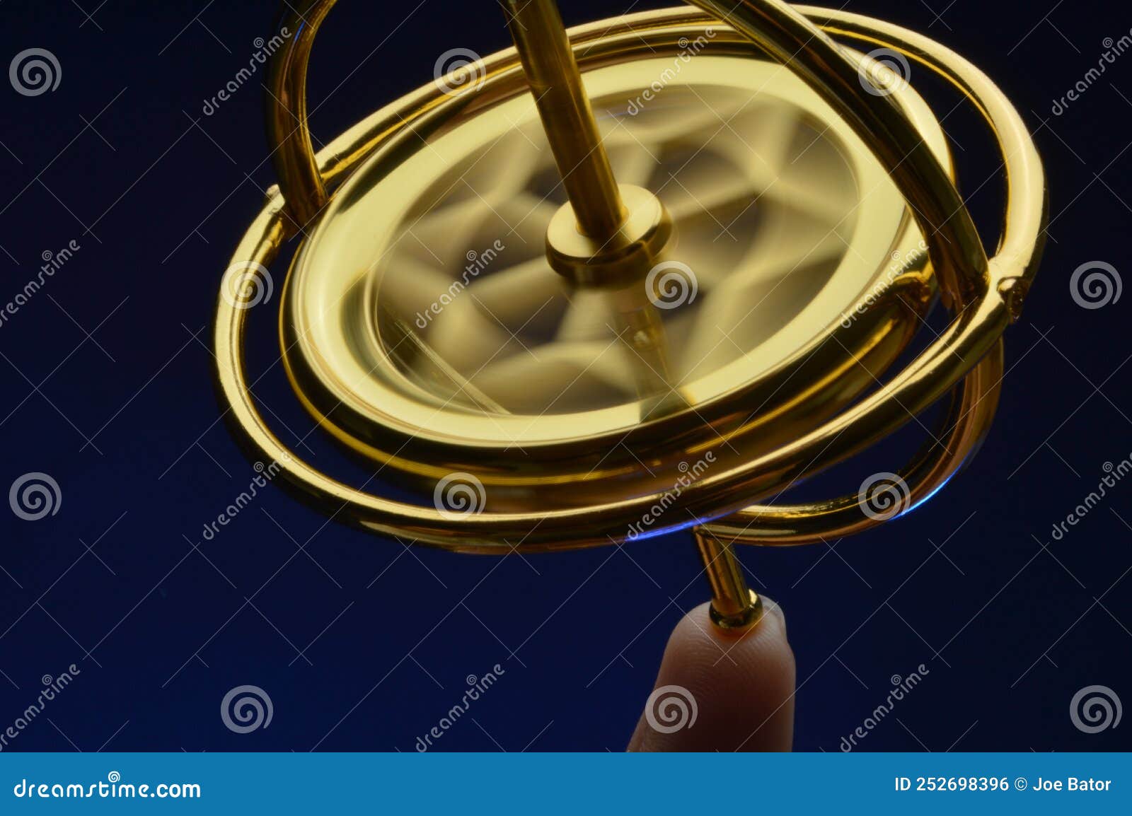 Gyroscope Balanced on Finger Tip Stock Photo - Image of spinning ...