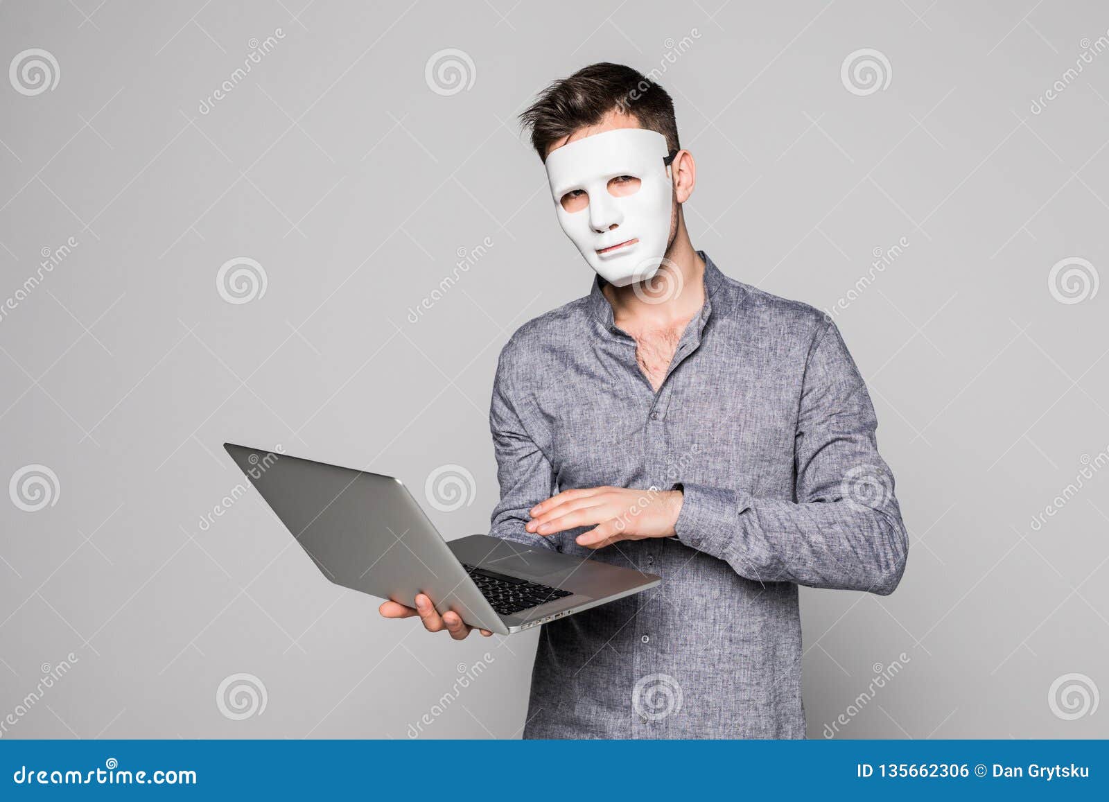 An Anonymous Villain, A Hidden Figure In A Black Cape With A Hood. A ...