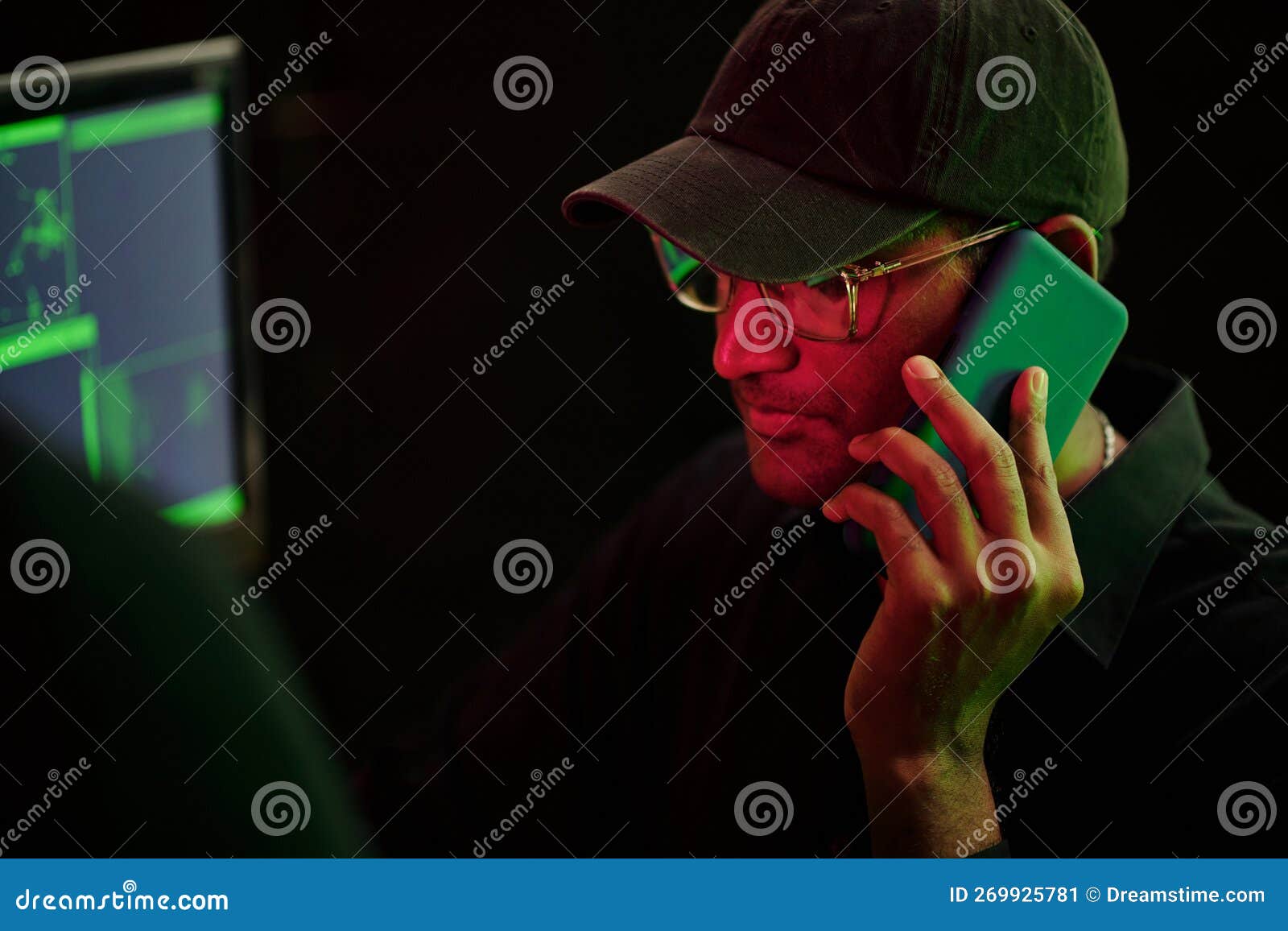 Hacker Talking on Phone stock image. Image of security - 269925781