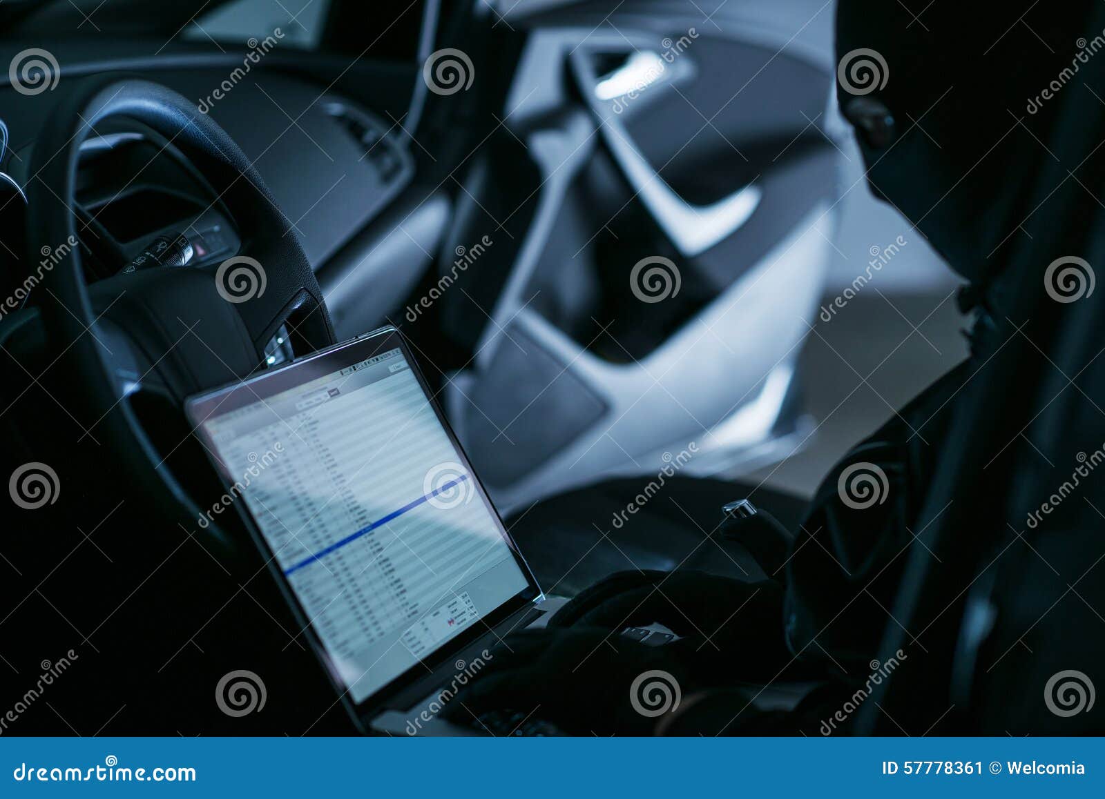 Hacker in a Car stock image. Image of flashlight, laptop - 57778361