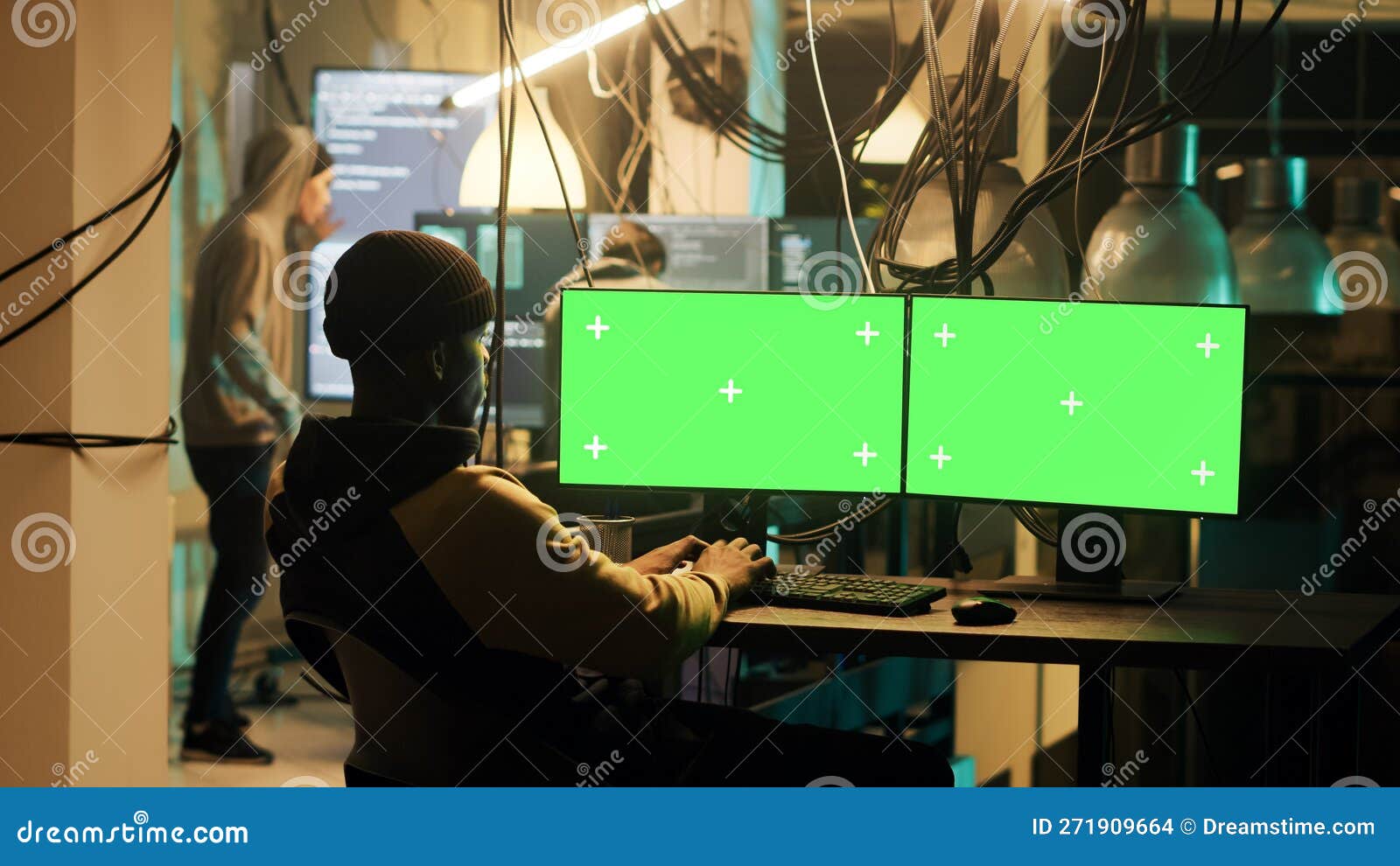 Hacker Checking Computer Display with Greenscreen Stock Photo - Image ...