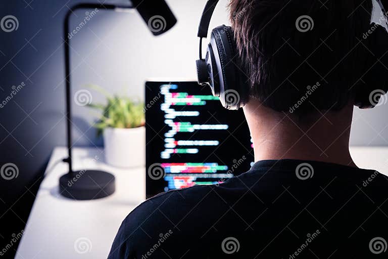 Hacker Or Code Developer With Laptop Malware Game Or Website Developing Cyber Criminal