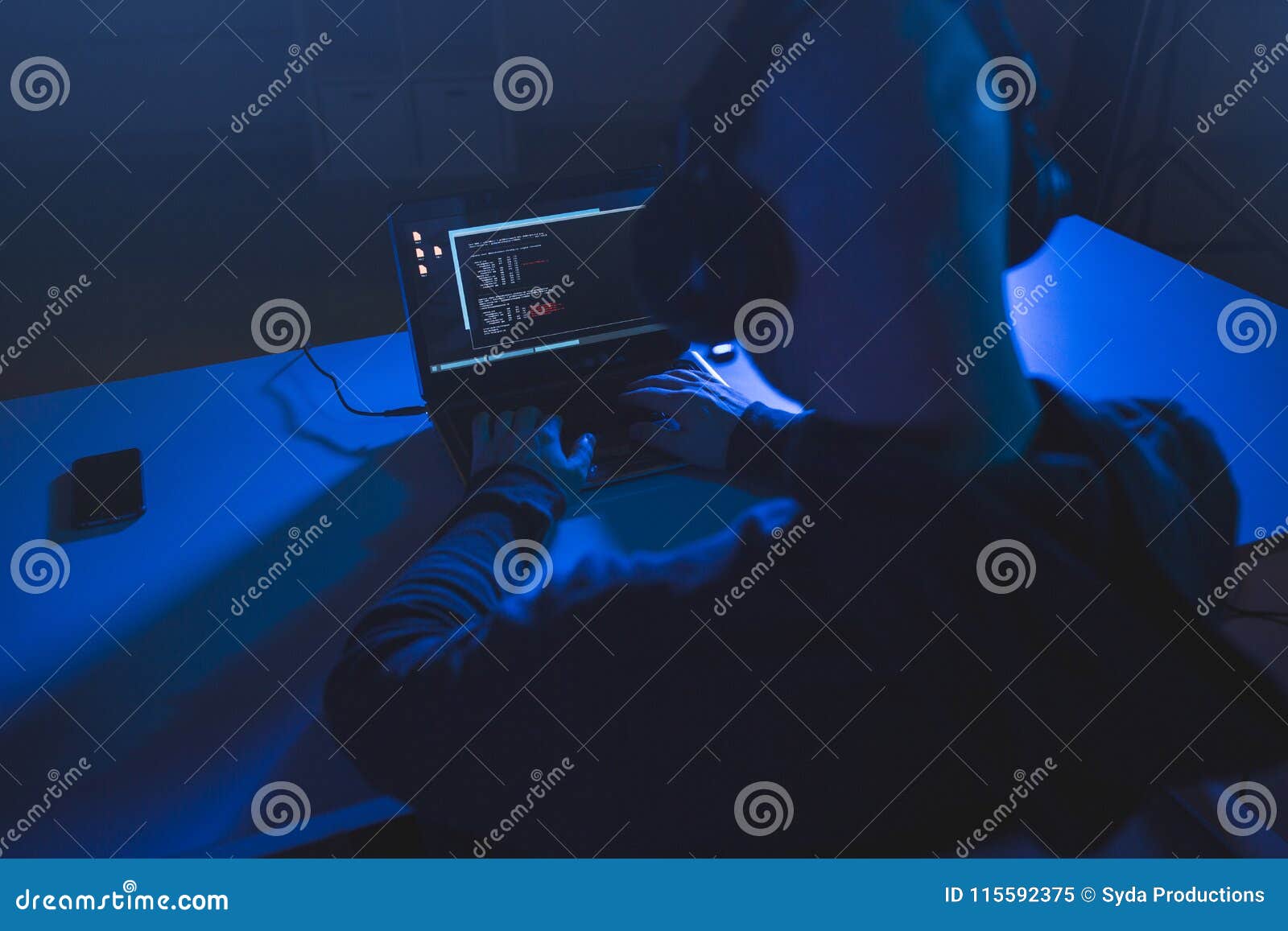 Hacker with Coding on Laptop Computer in Dark Room Stock Image - Image ...