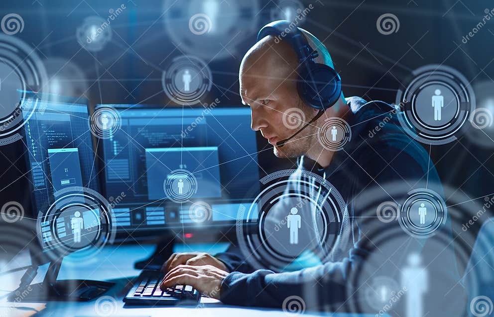 Hacker with Computer and Headset in Dark Room Stock Photo - Image of ...