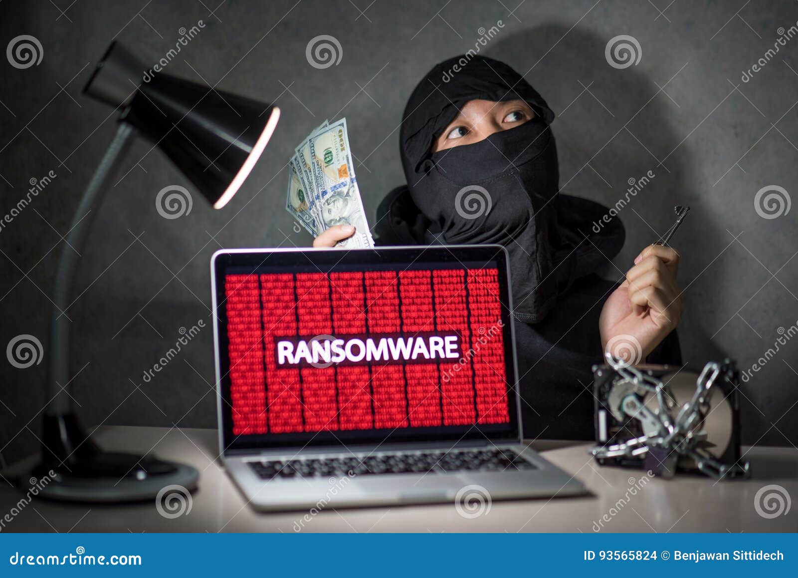 Hacker with Computer Screen Showing Ransomware Attacking Stock Photo ...